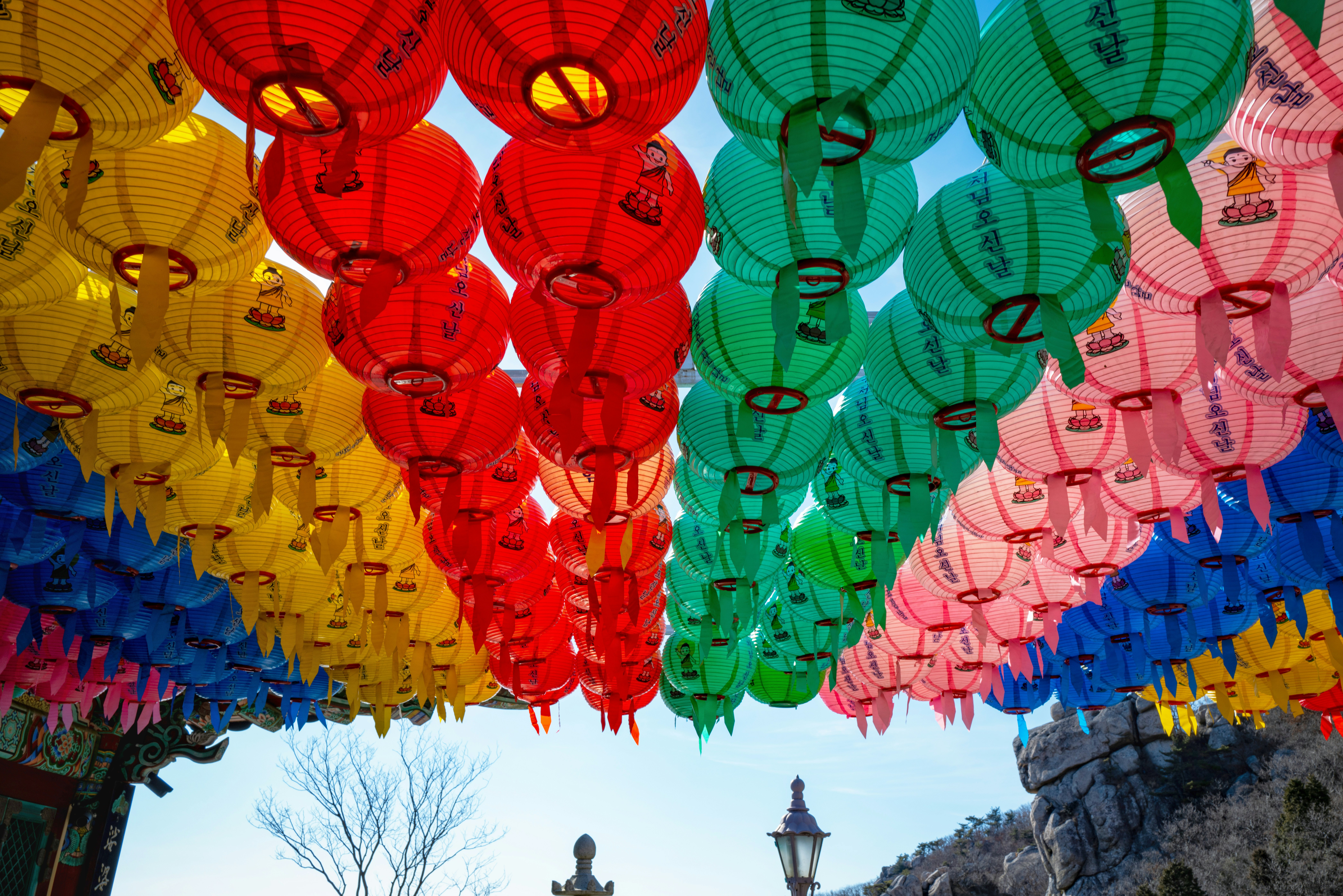 Lantern Canopy: A Rainbow over a Quiet Street