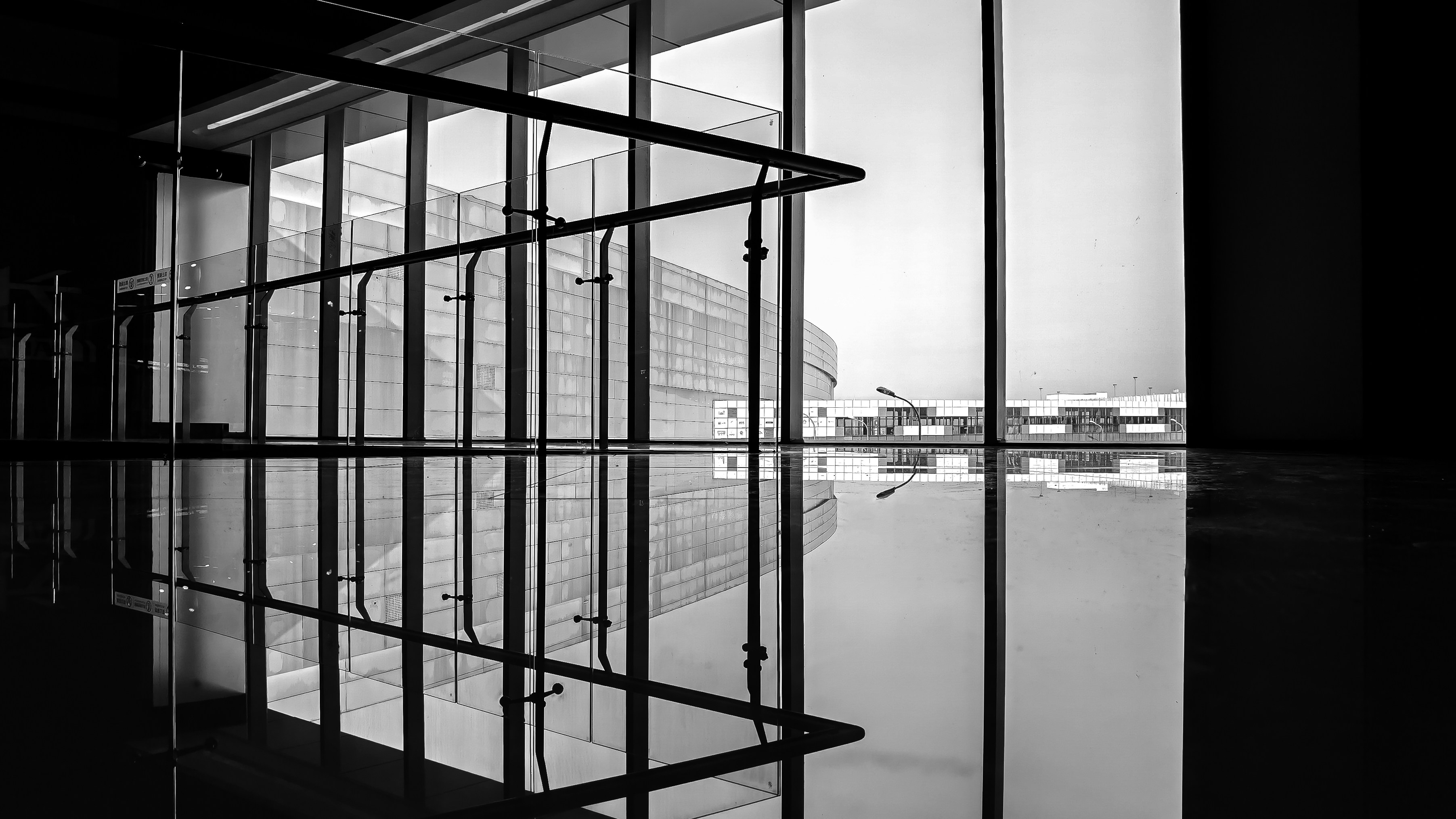 Clear glass building near body of water during daytime photo – Free ...