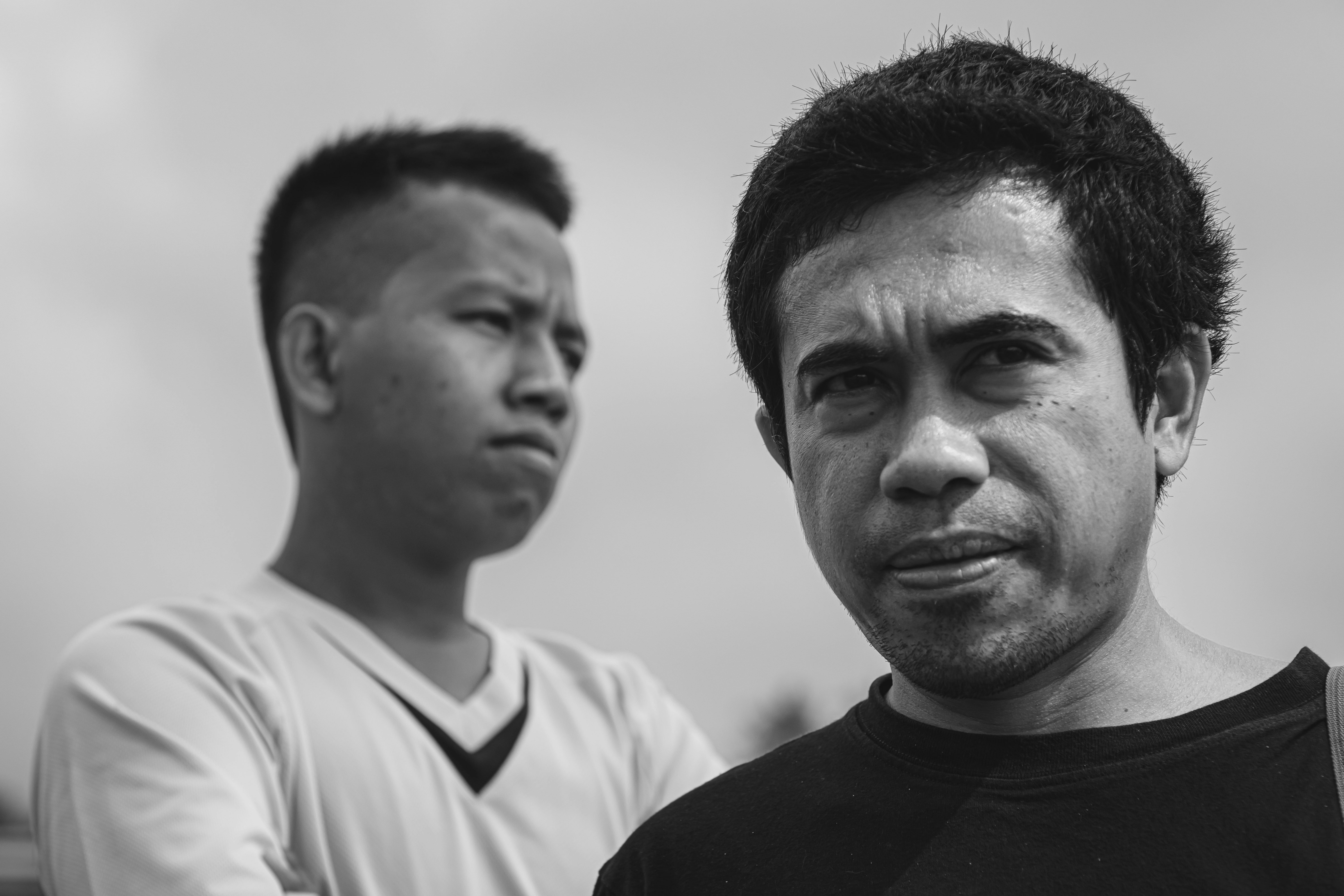 This Man serious looks you | man in white crew neck shirt