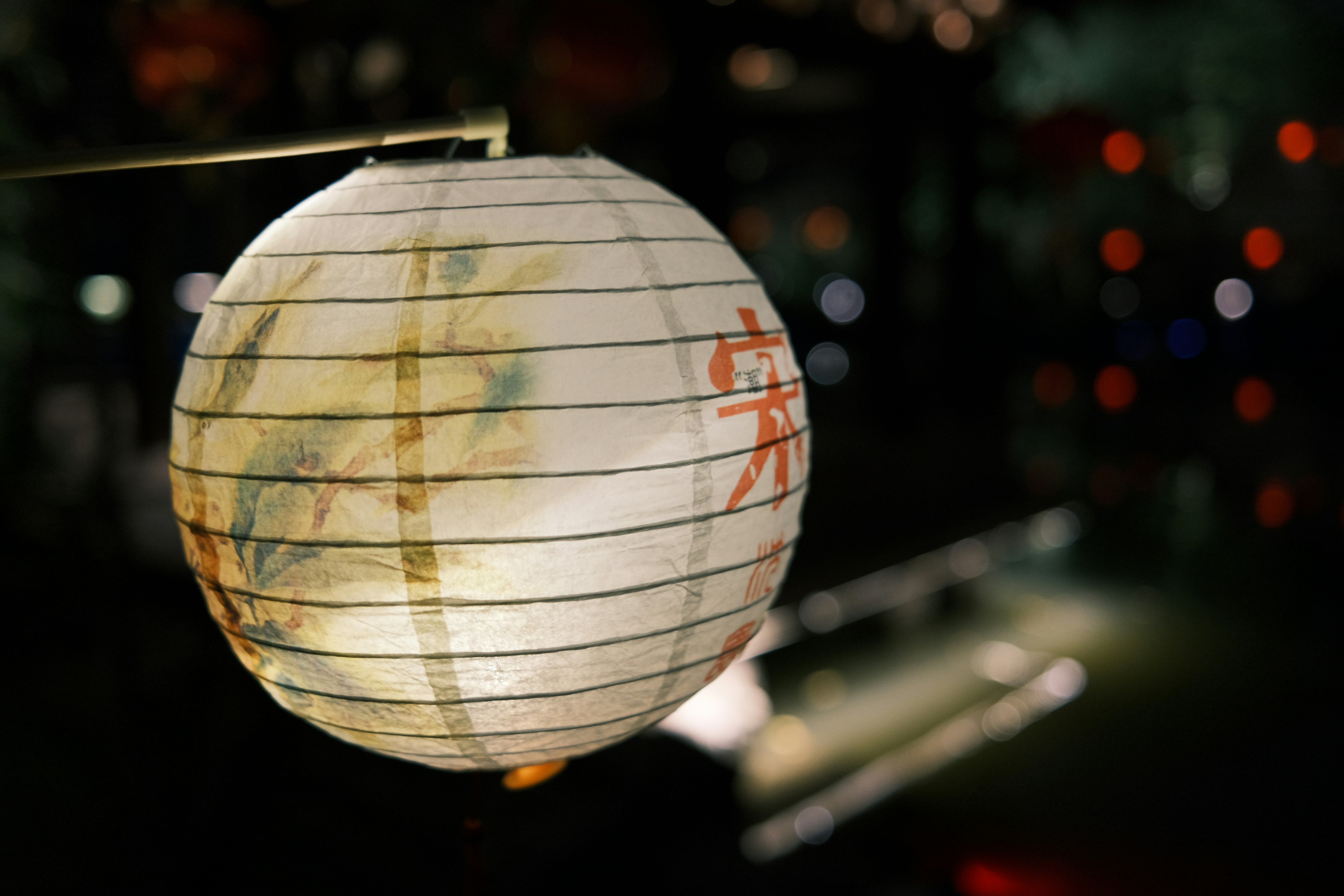 white and yellow paper lantern