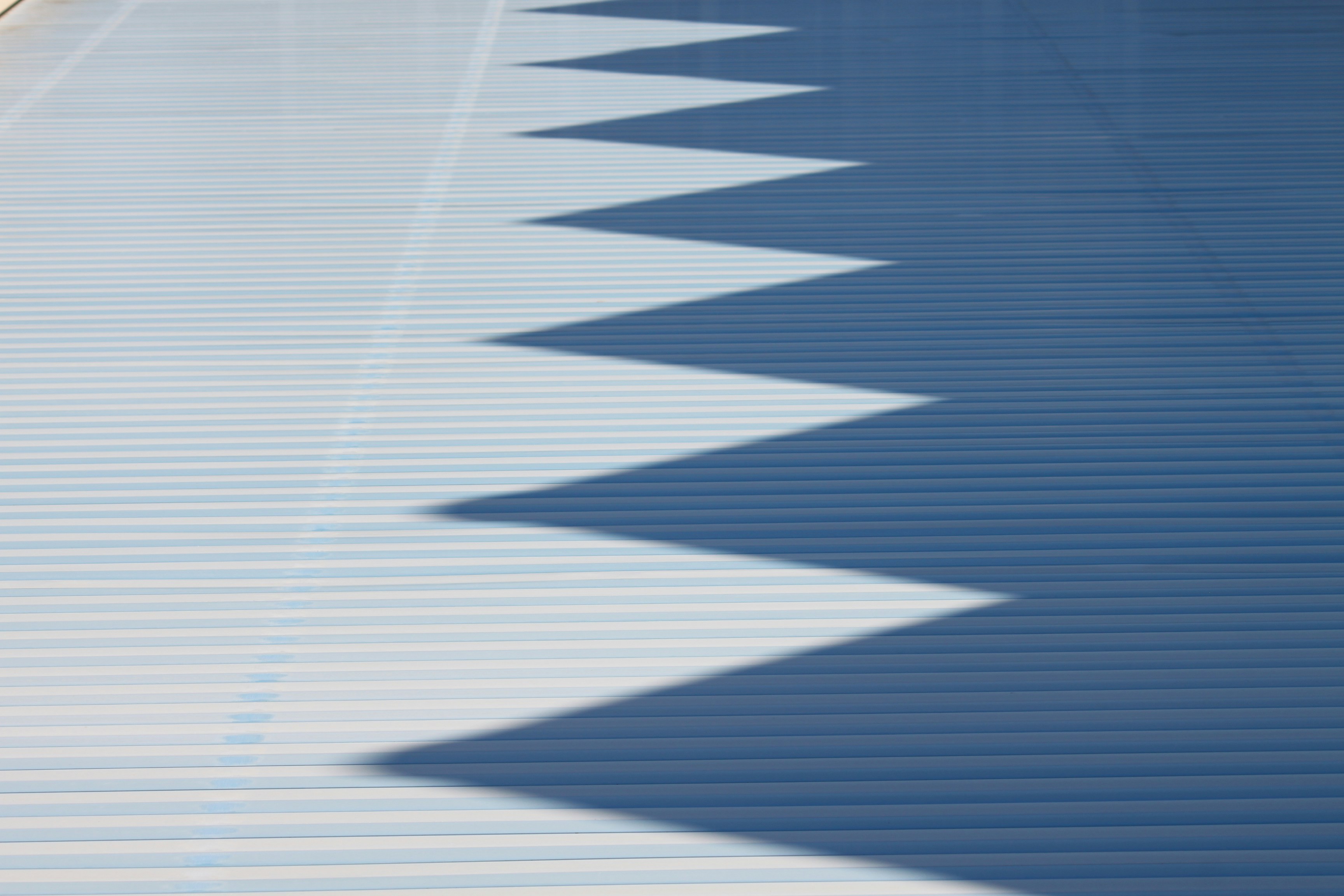 Shadowed Zigzags Across a Corrugated Surface