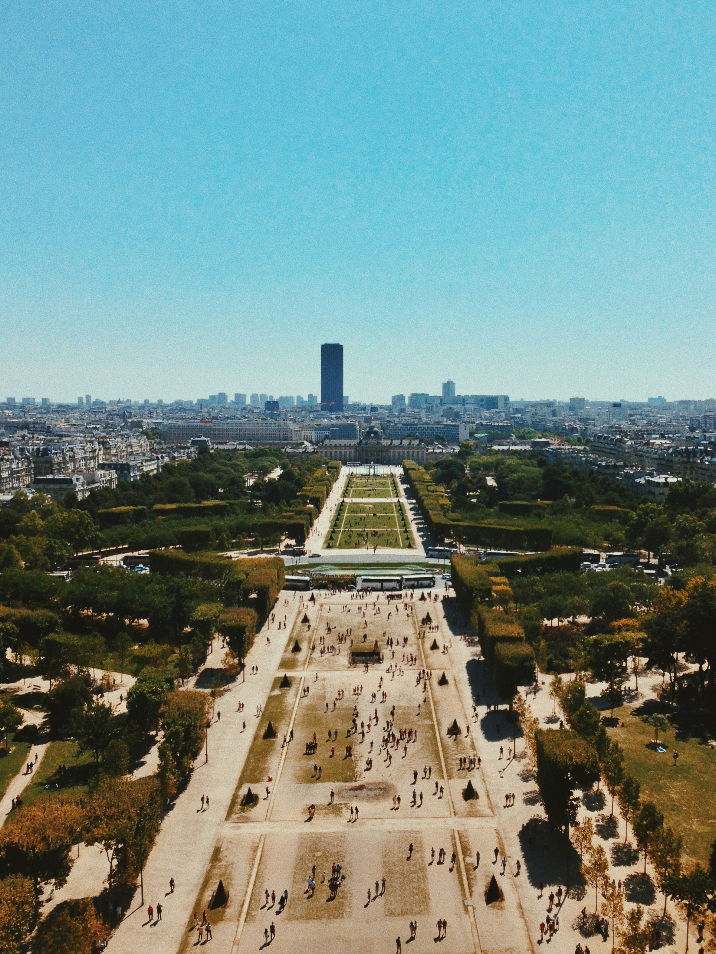 Sunlit Axis: Aerial Perspective Toward a Distant Skyline