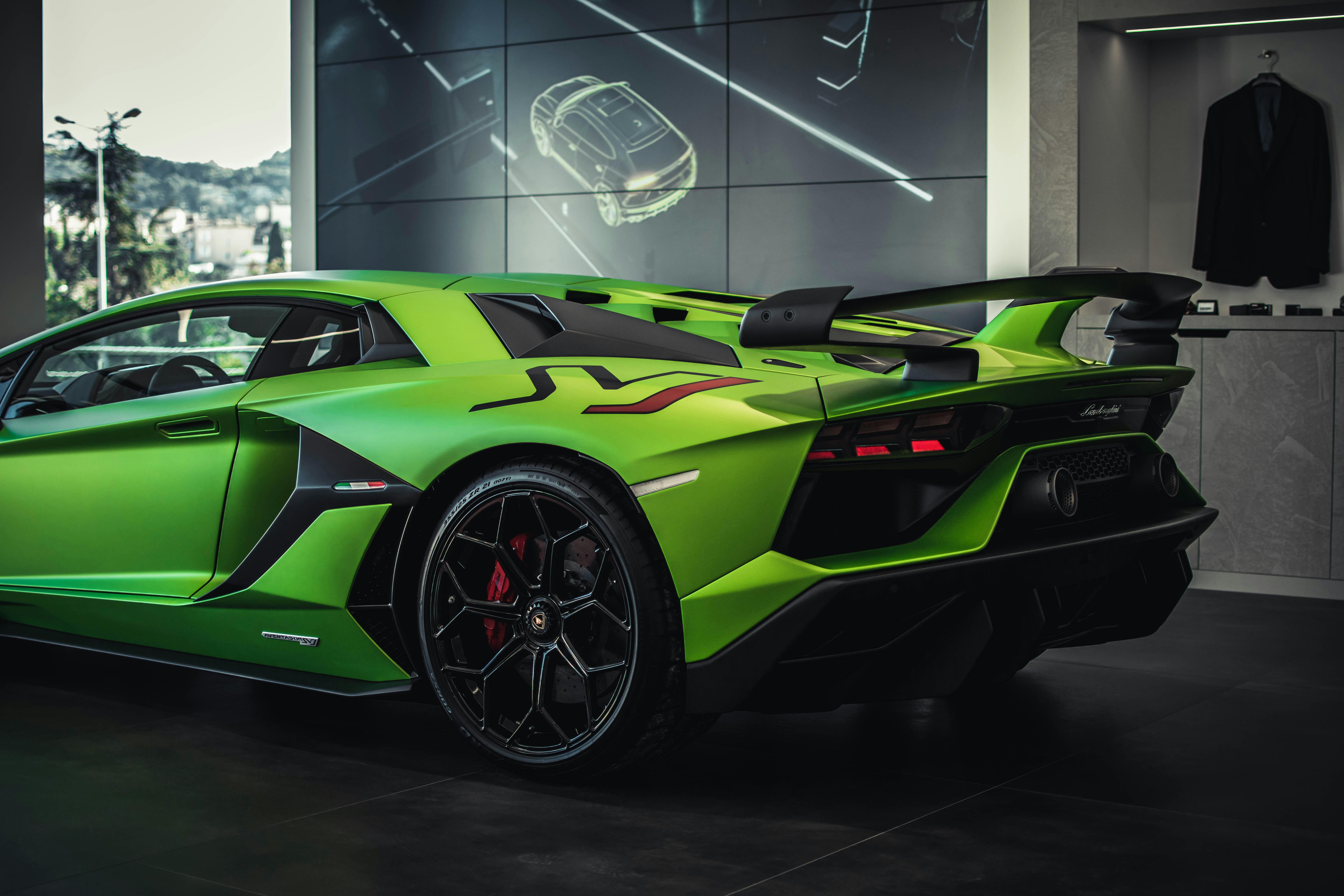 Lamborghini Aventador SVJ | green and black lamborghini sports car