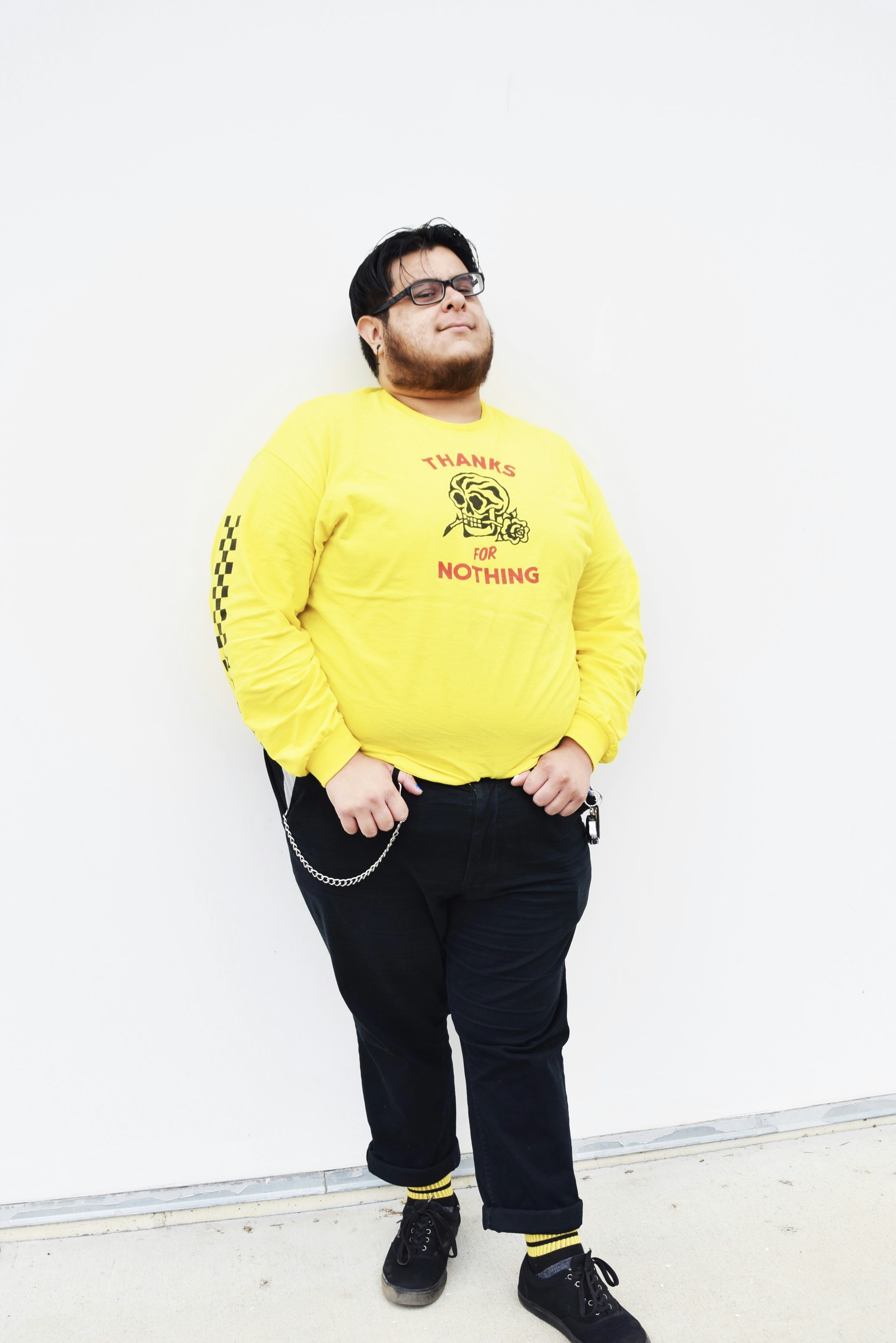 Man in yellow crew neck long sleeve shirt and black pants photo – Free ...