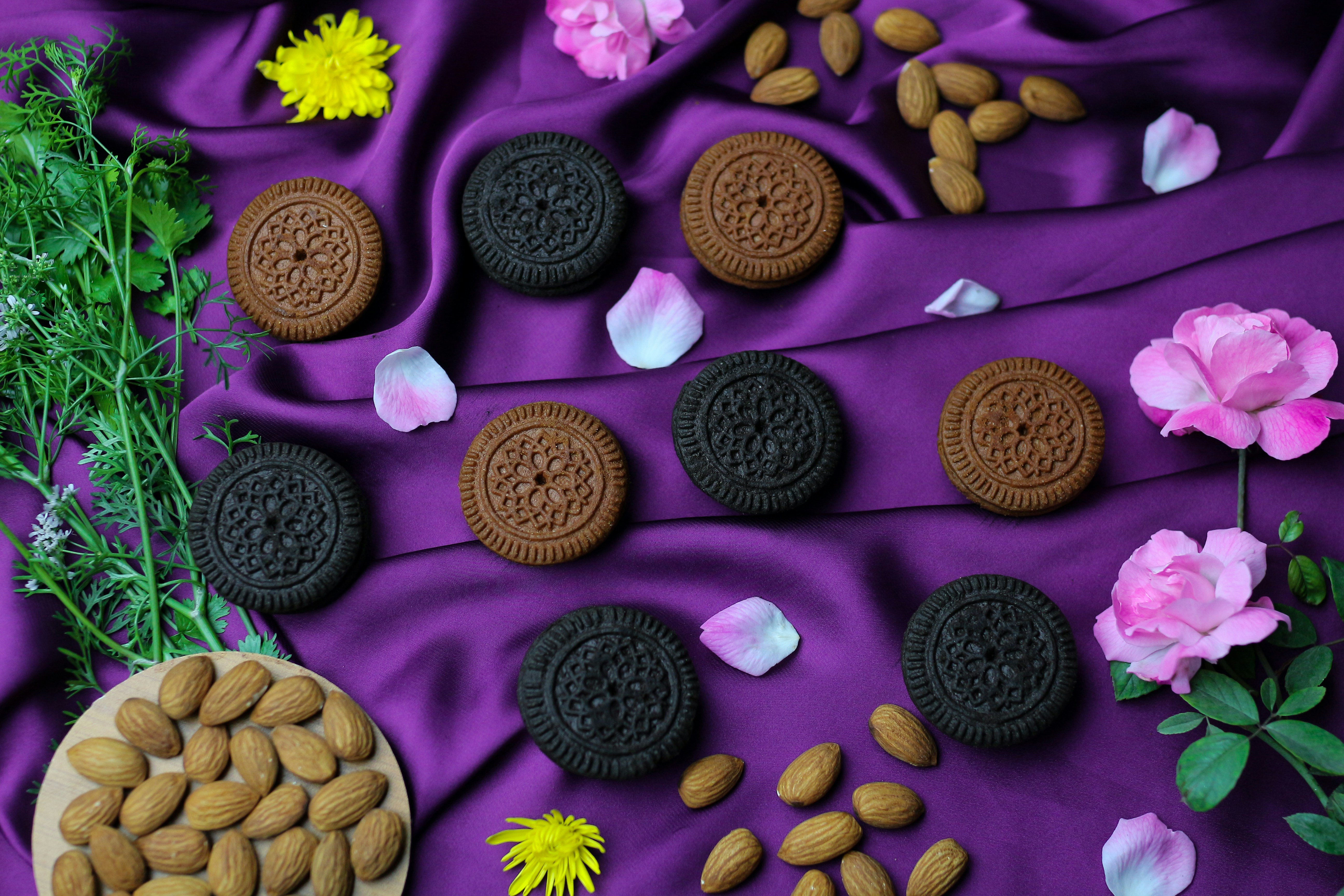 Delicious cookies and nuts with flowers