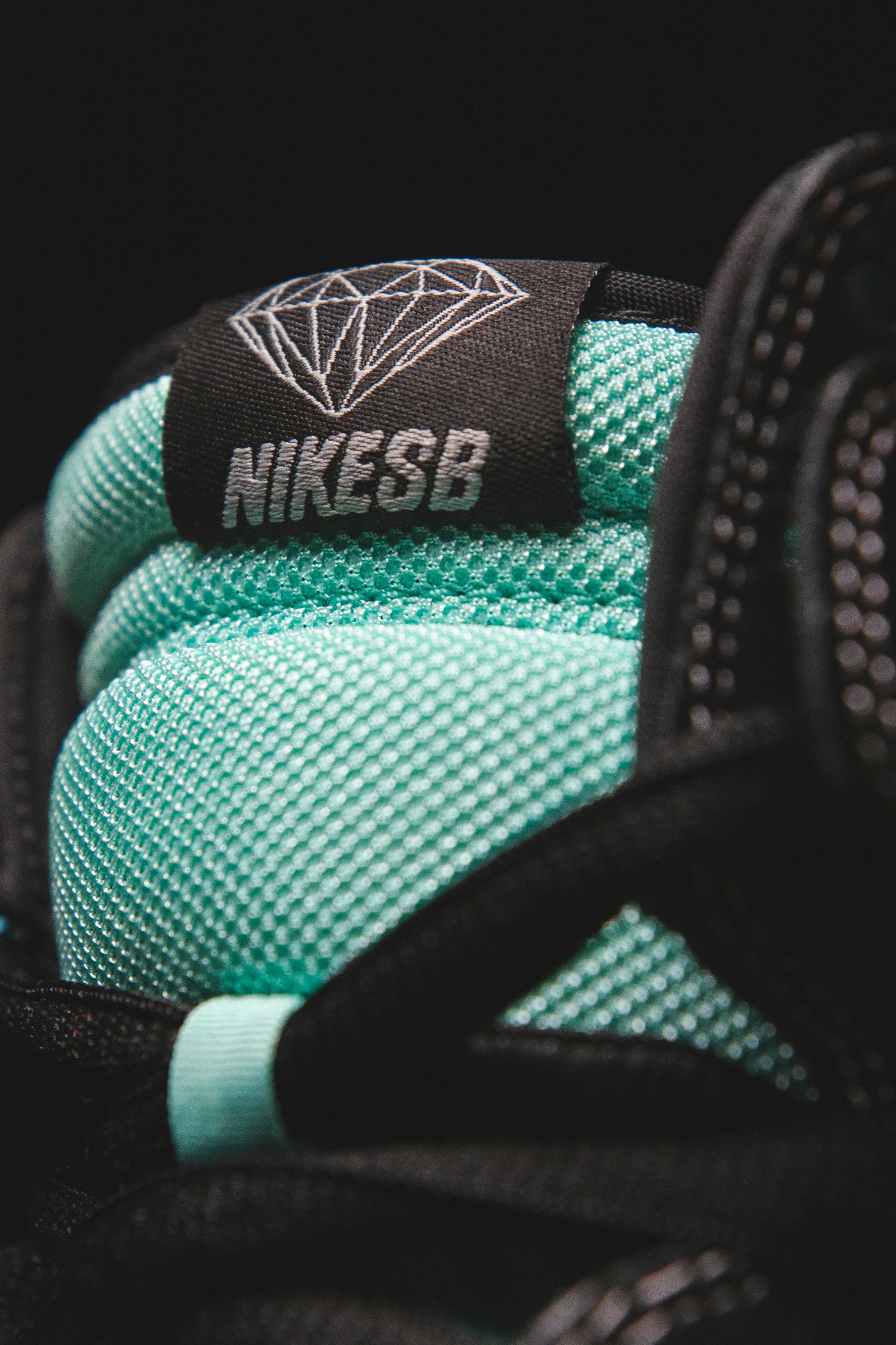 Mint-Turf Macro: Nike SB Tongue Tag in Close-Up Detail