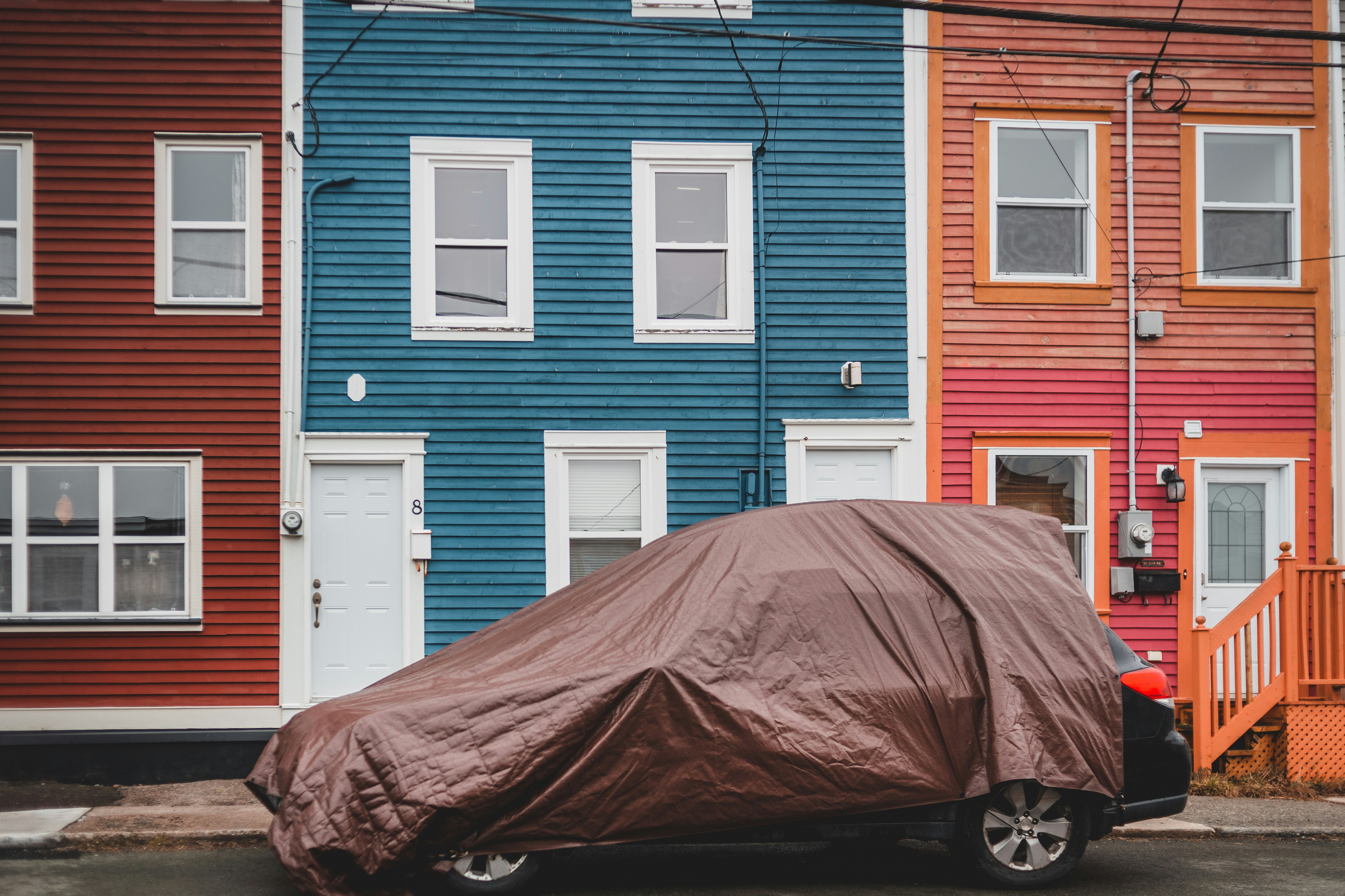 Hidden Car in a Palette of Painted Townhouses