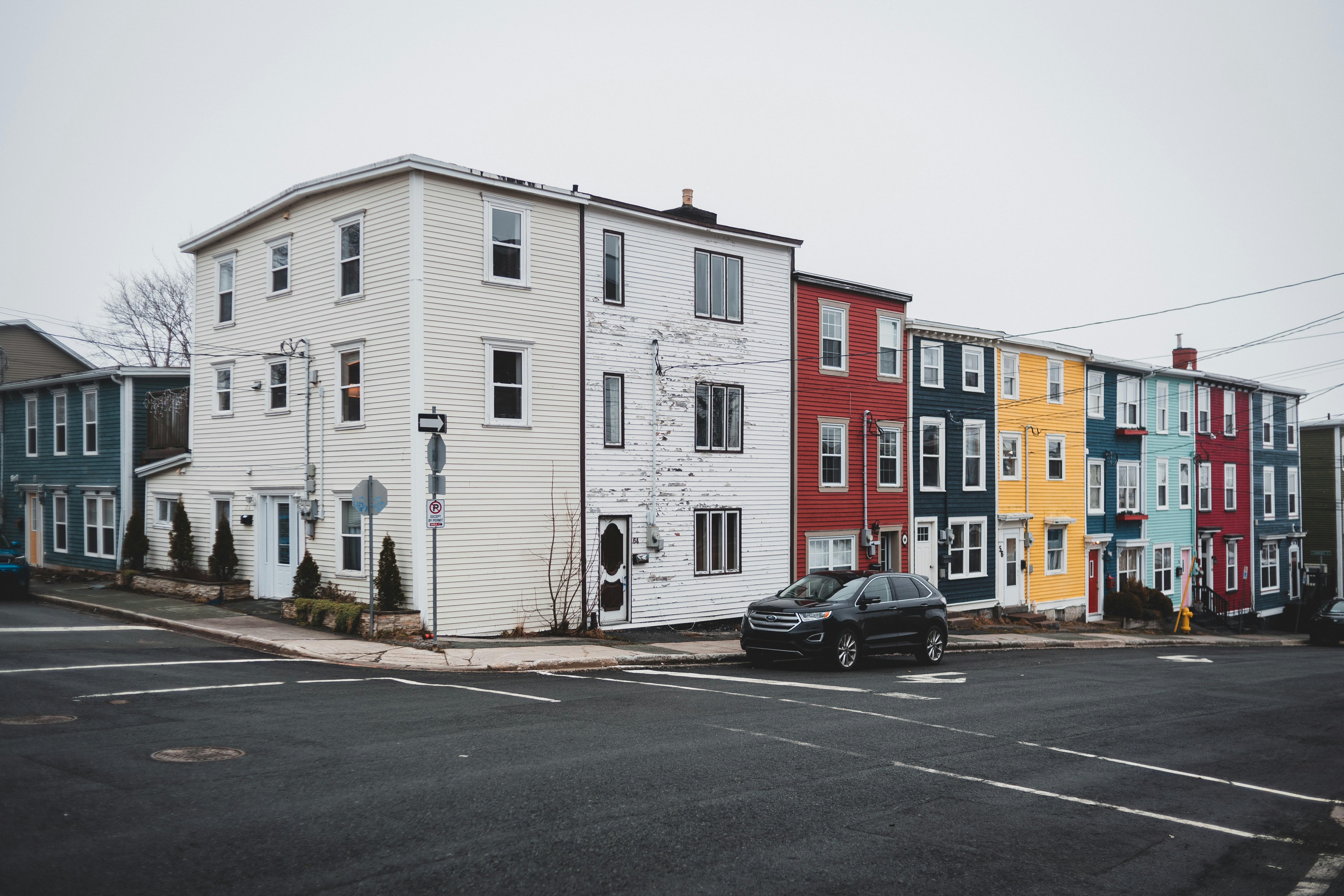 Row of Colorful Townhouses on a Quiet Street