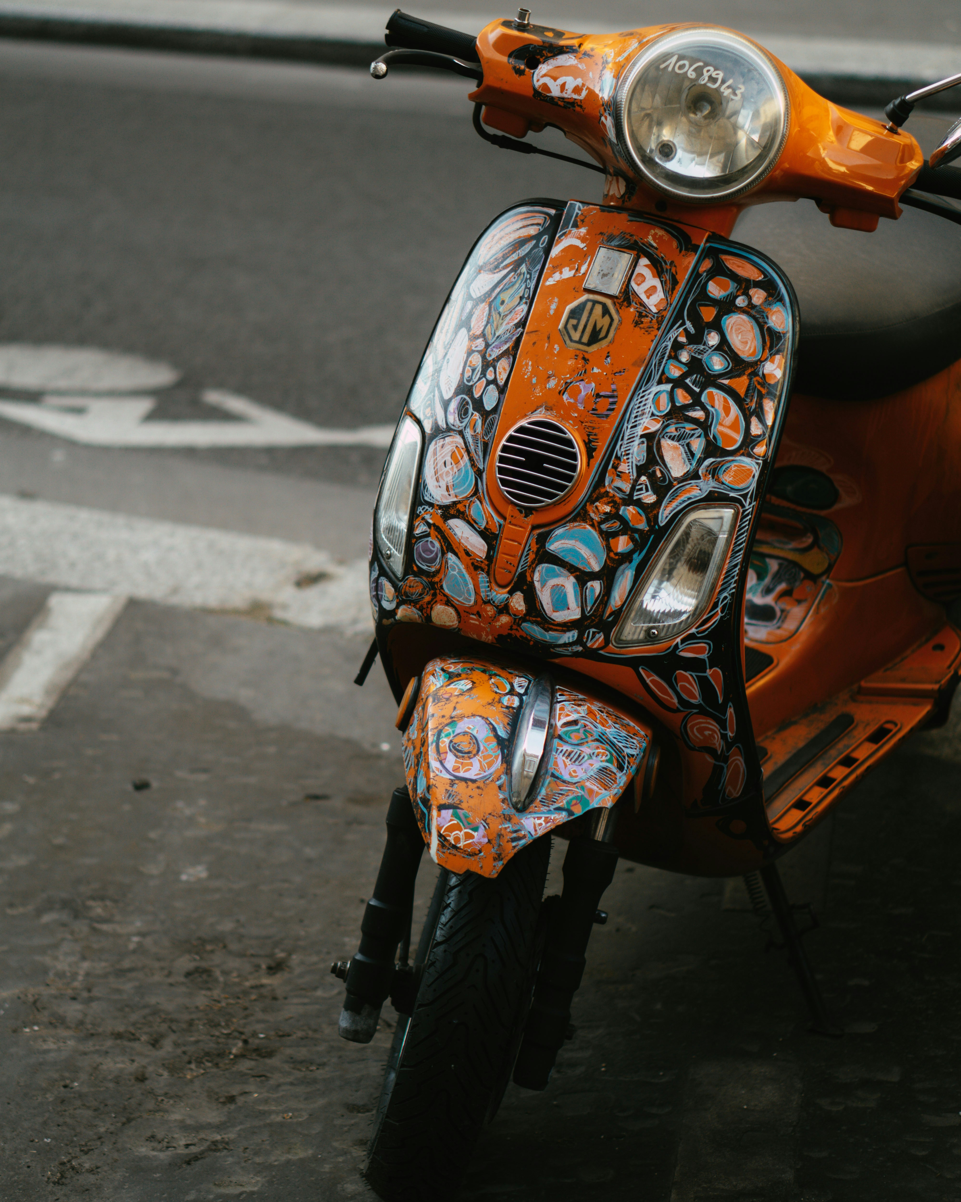 Vibrant Graffiti-Varnished Scooter Front