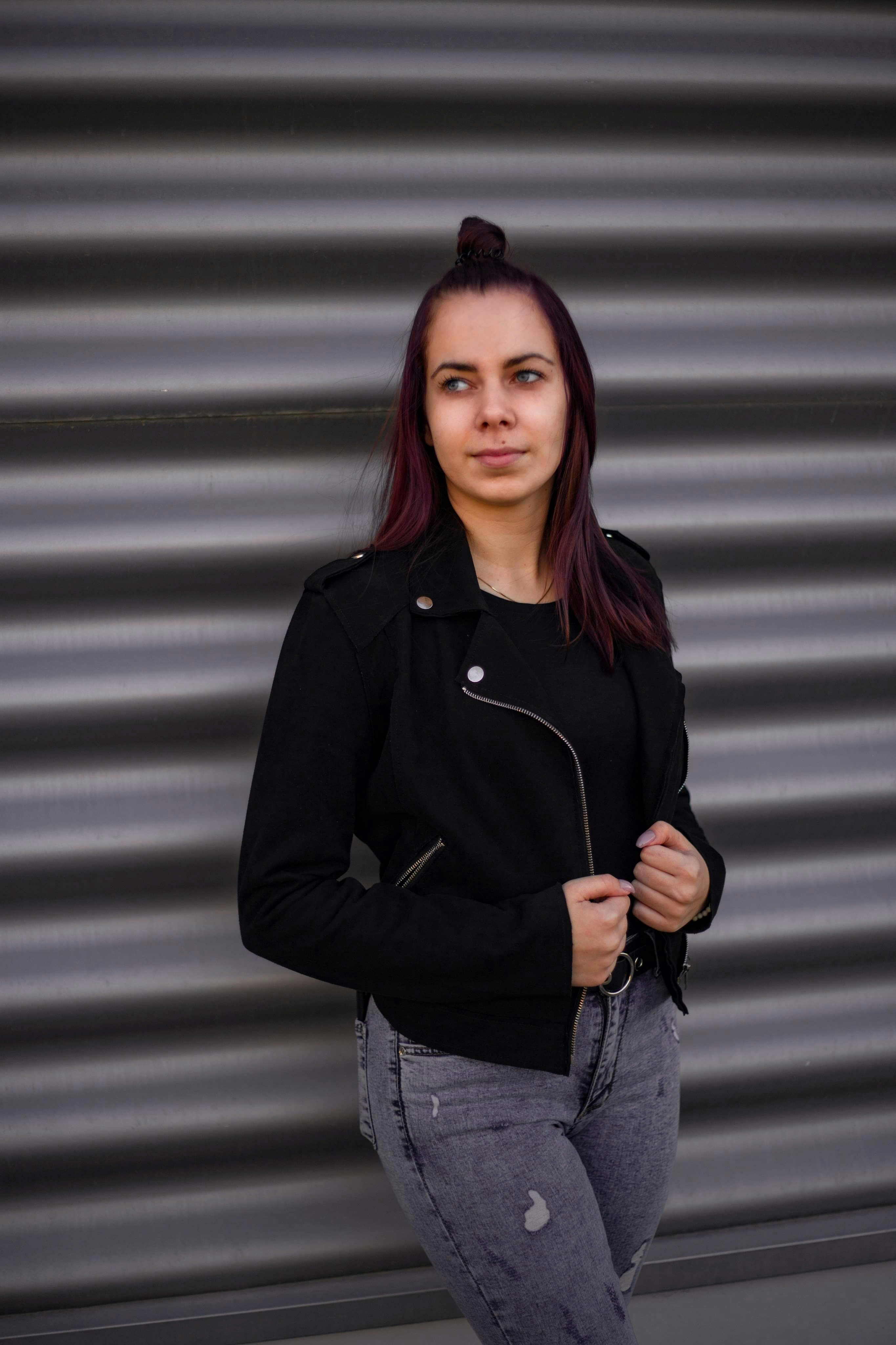 Gaze Between Steel Ridges: Portrait in an Industrial Backdrop
