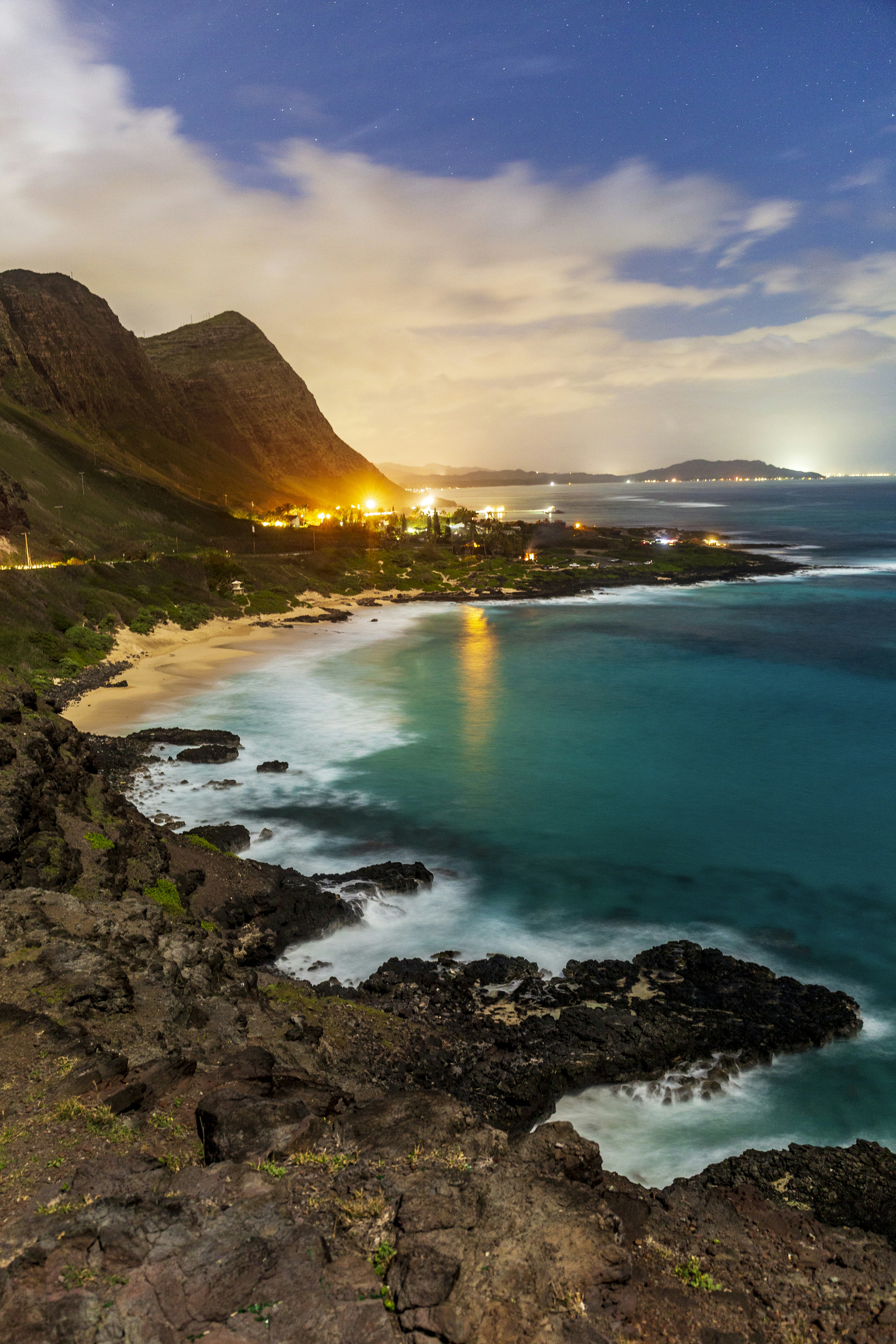Moonlit Coastline Under a Starry Sky