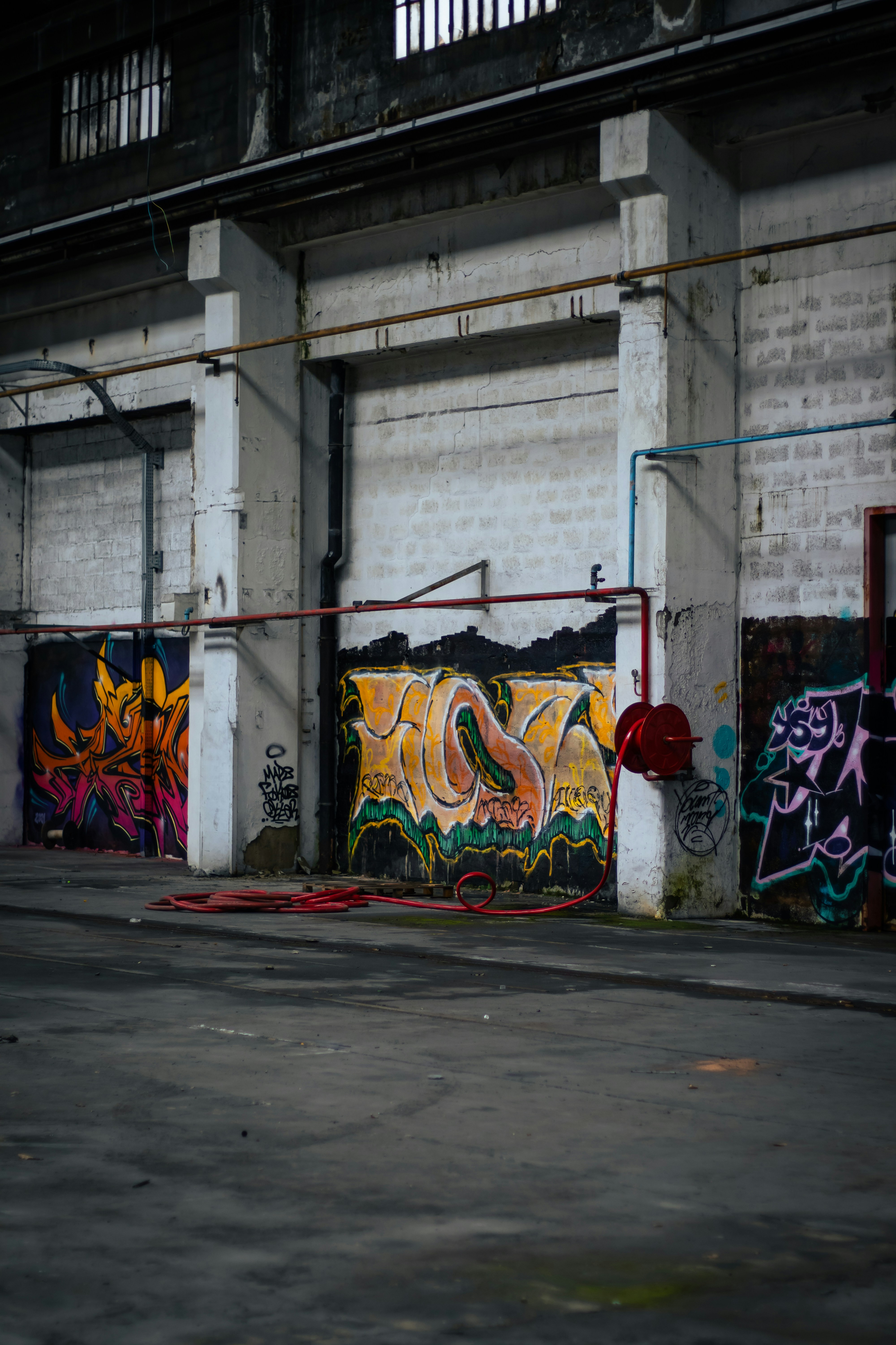 Red blue and yellow graffiti on wall photo – Free Graffiti Image on ...