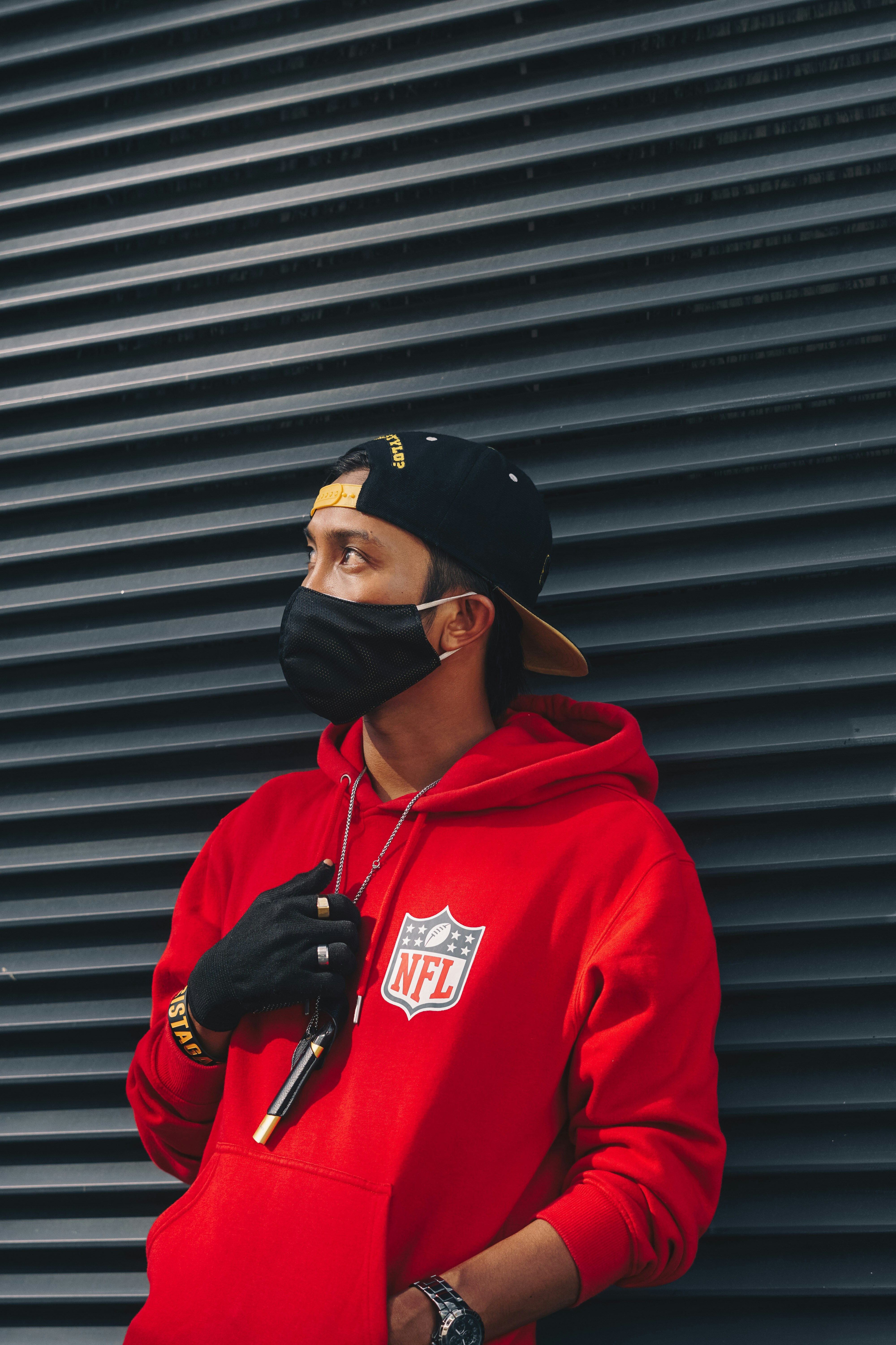 Masked Messenger in a Red Hoodie