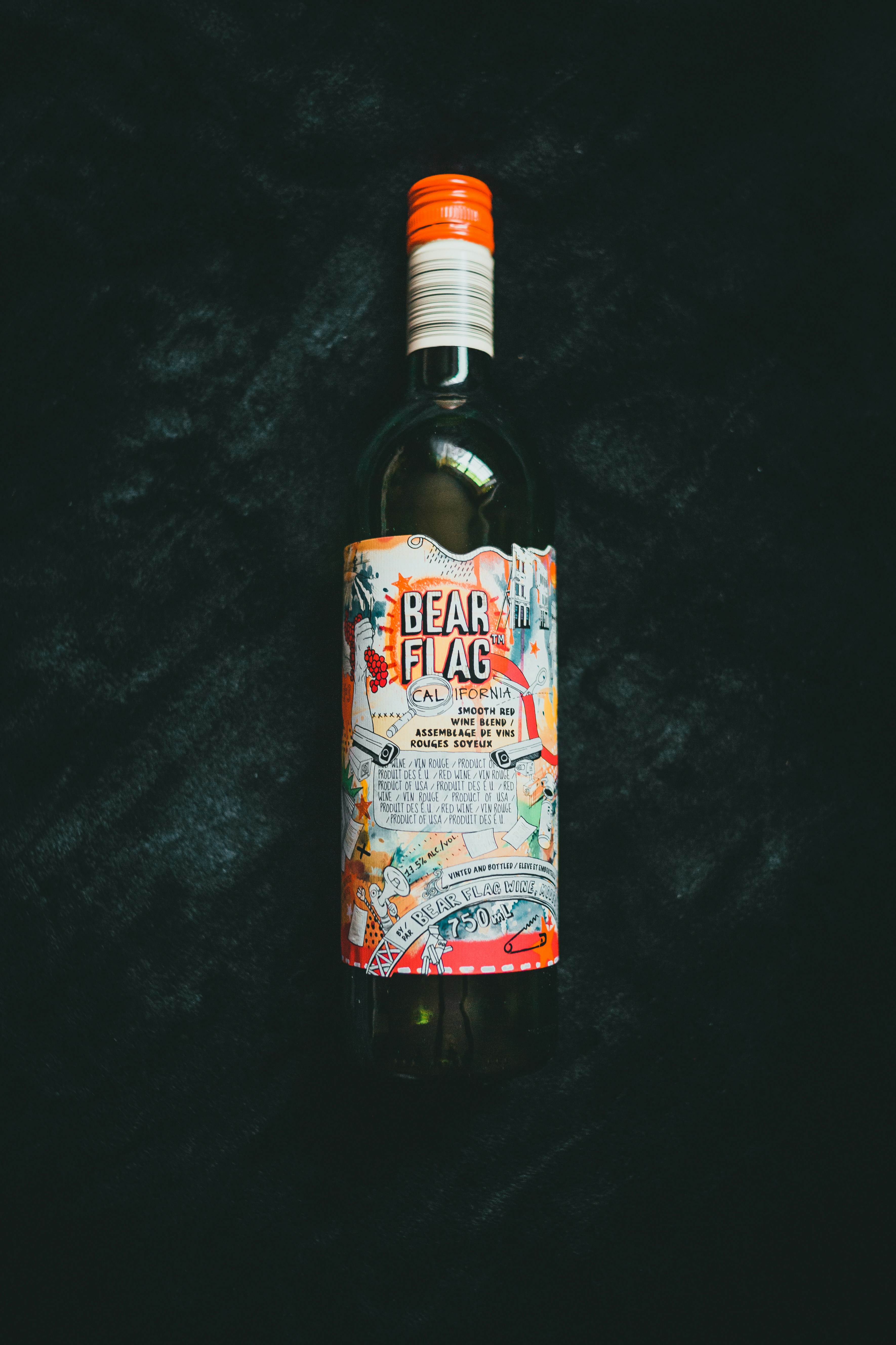white and black labeled bottle