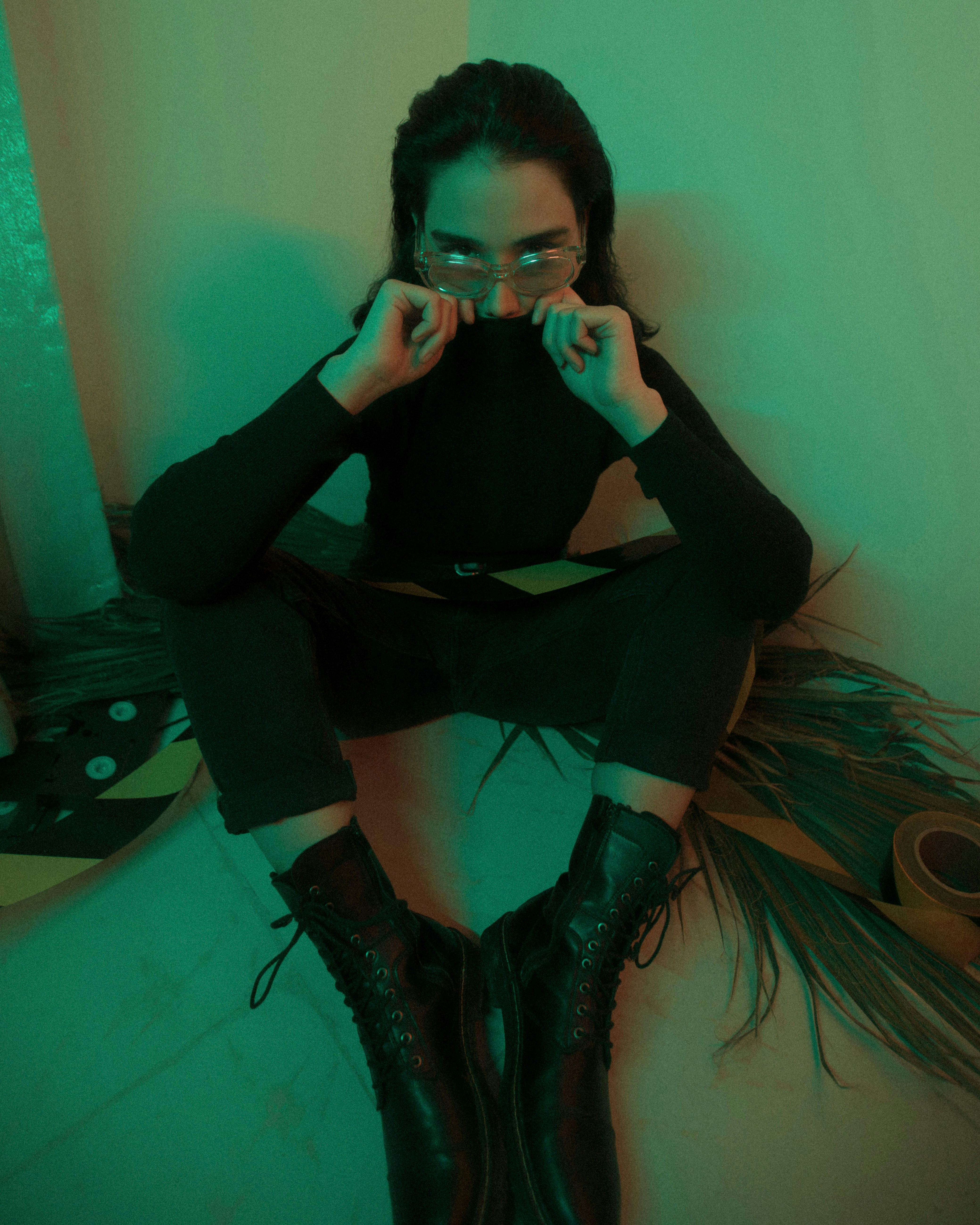 Woman in black leather jacket covering her face photo – Free Apparel ...