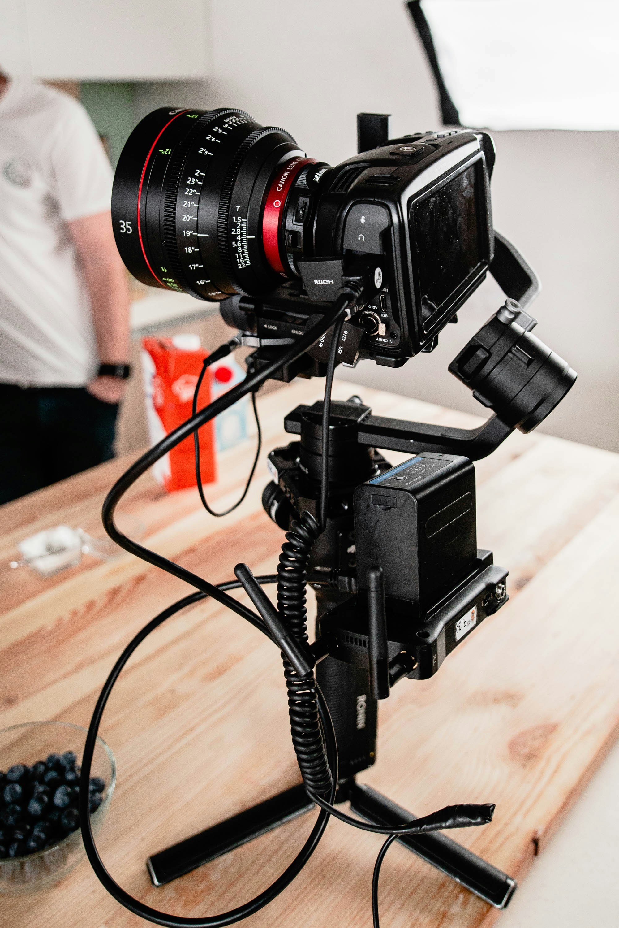 Black dslr camera on brown wooden table photo – Free Human Image on ...