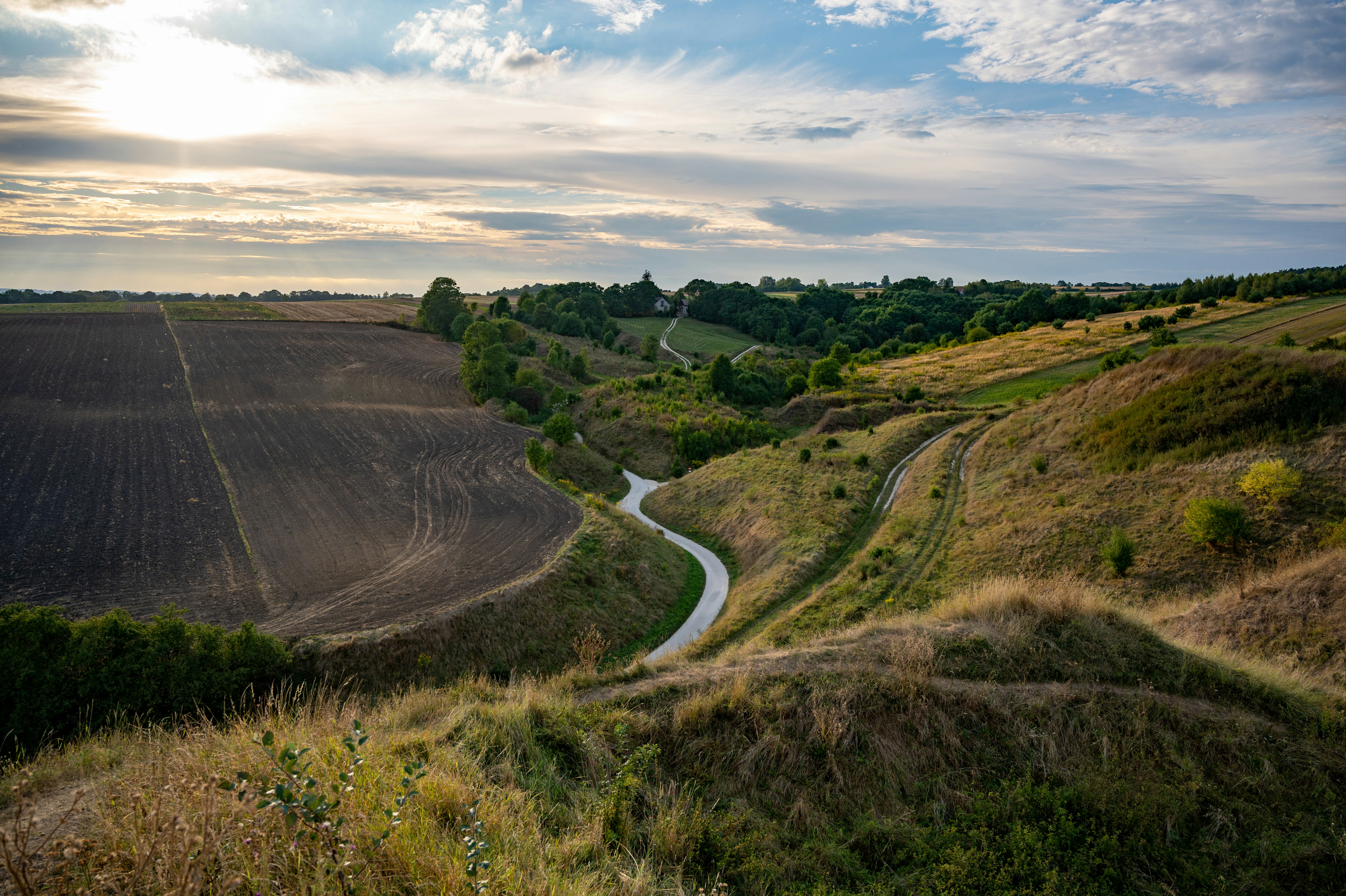 S-Curve Valley: The River Wends Through Golden Hills at Dusk