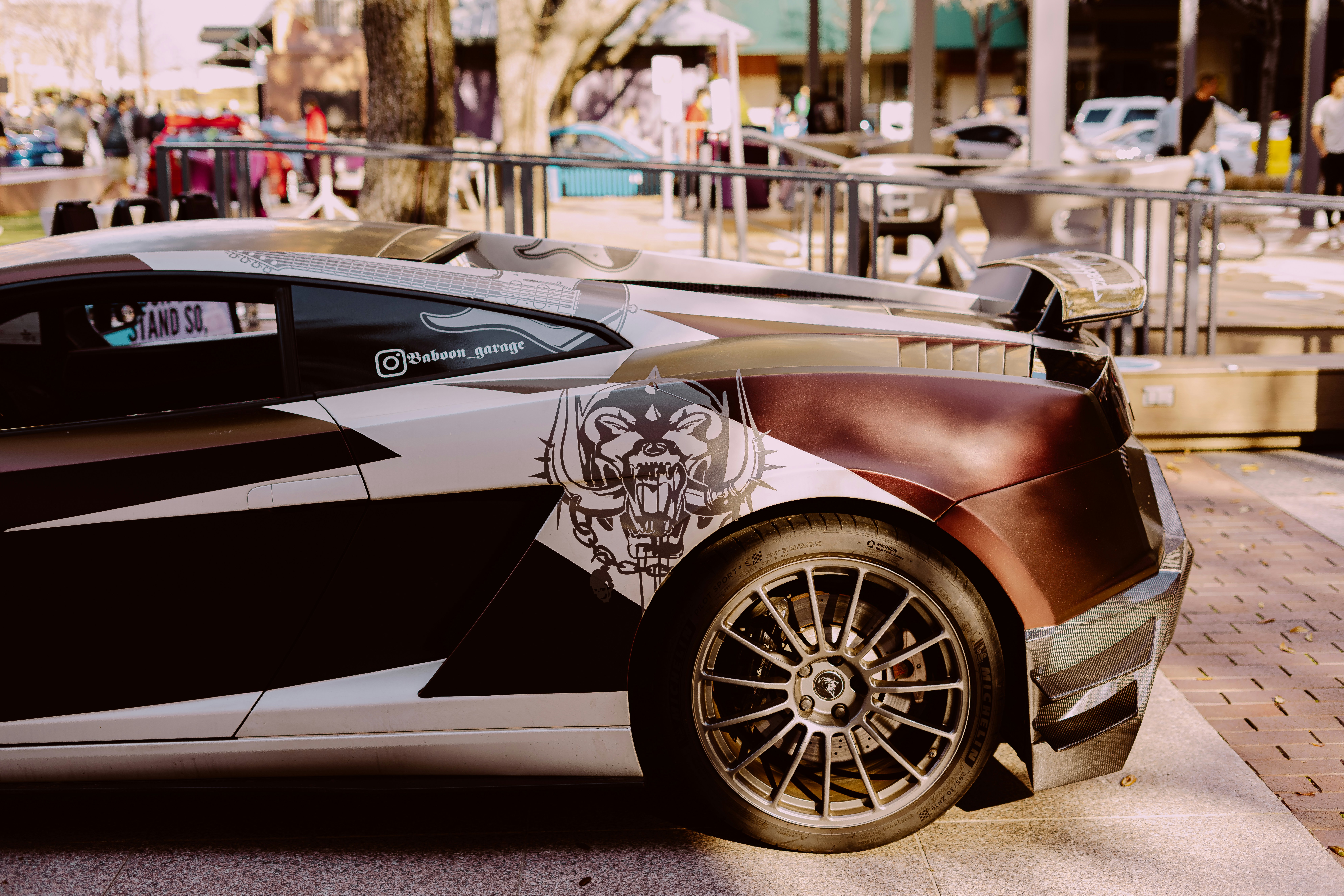 Urban Mirage: A customized sports car with bold geometric graphics and a skull logo