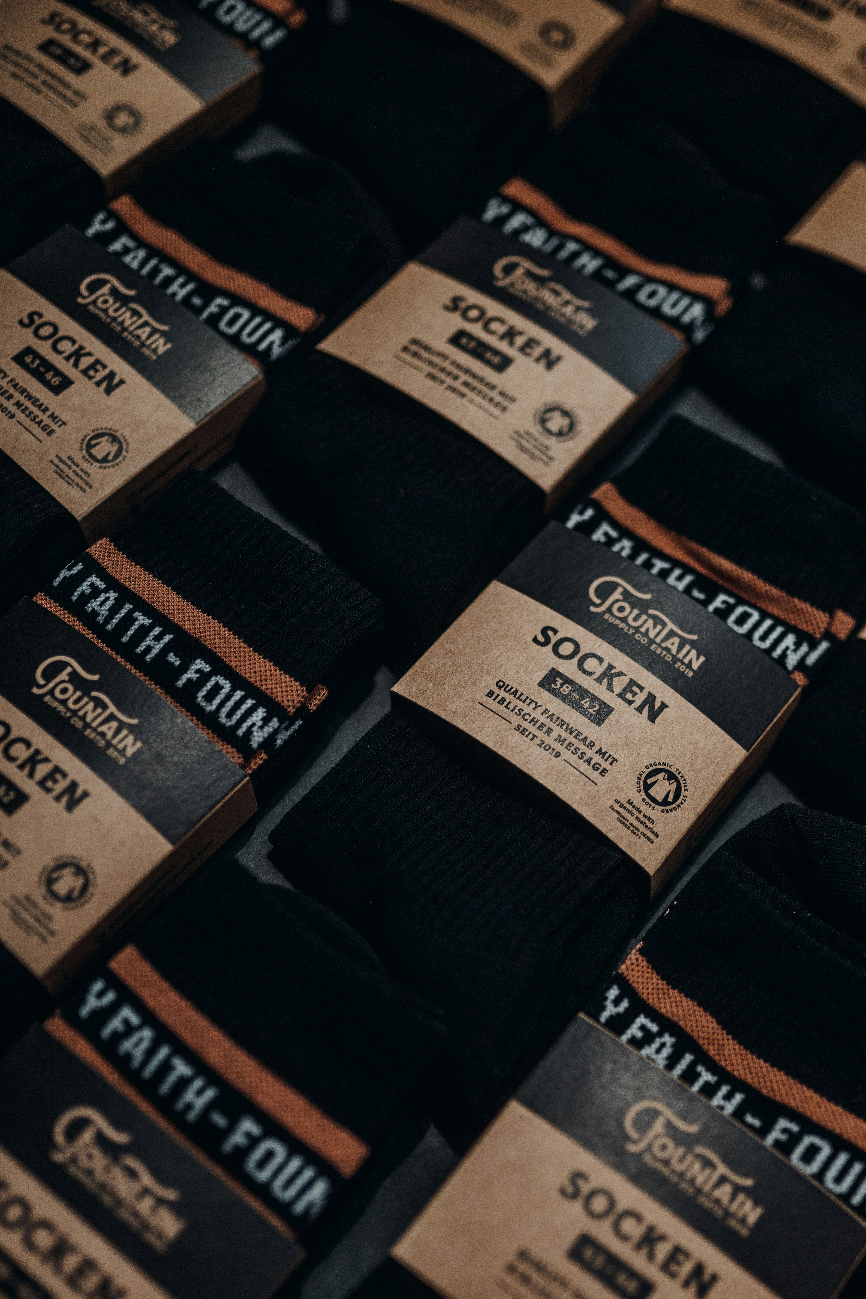 Faith in Socks: Close-knit Rows of Framed Black Knitwear