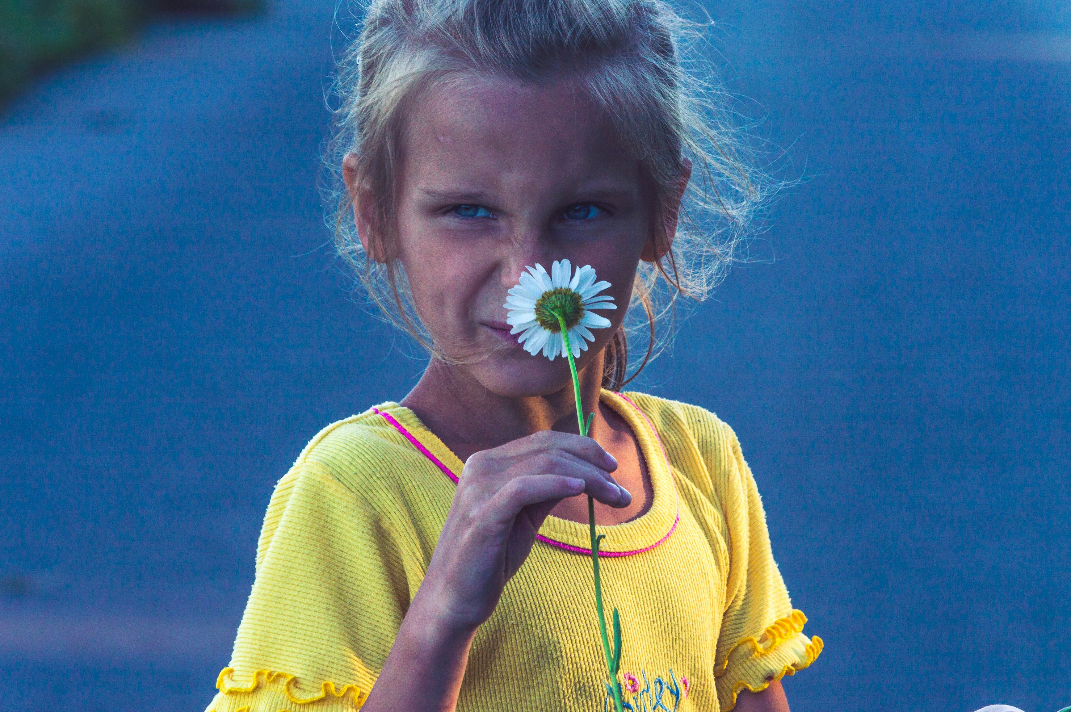 Daisy Moment: A Girl in Yellow Shares a Quiet Smile
