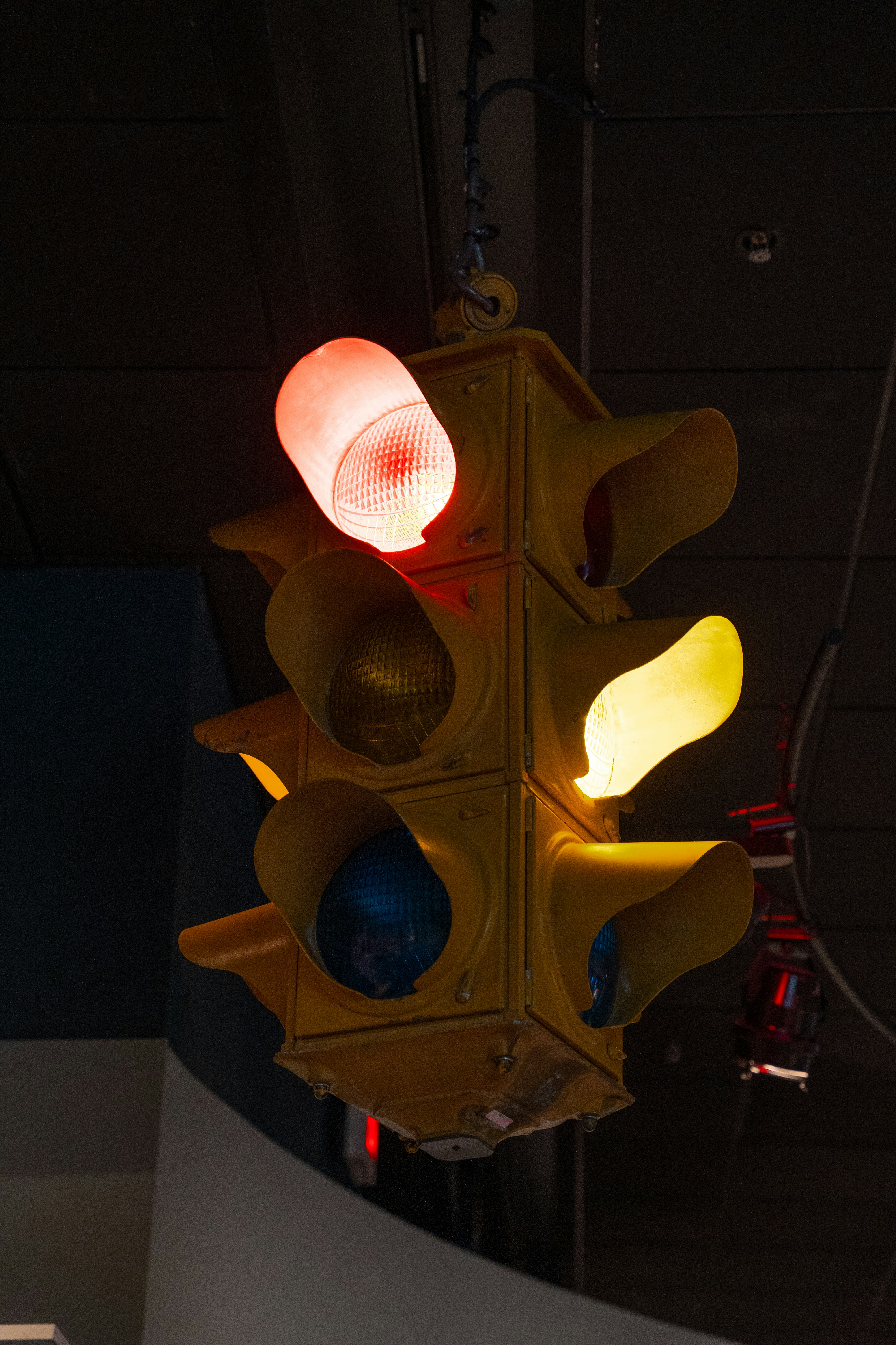 red traffic light turned on during daytime