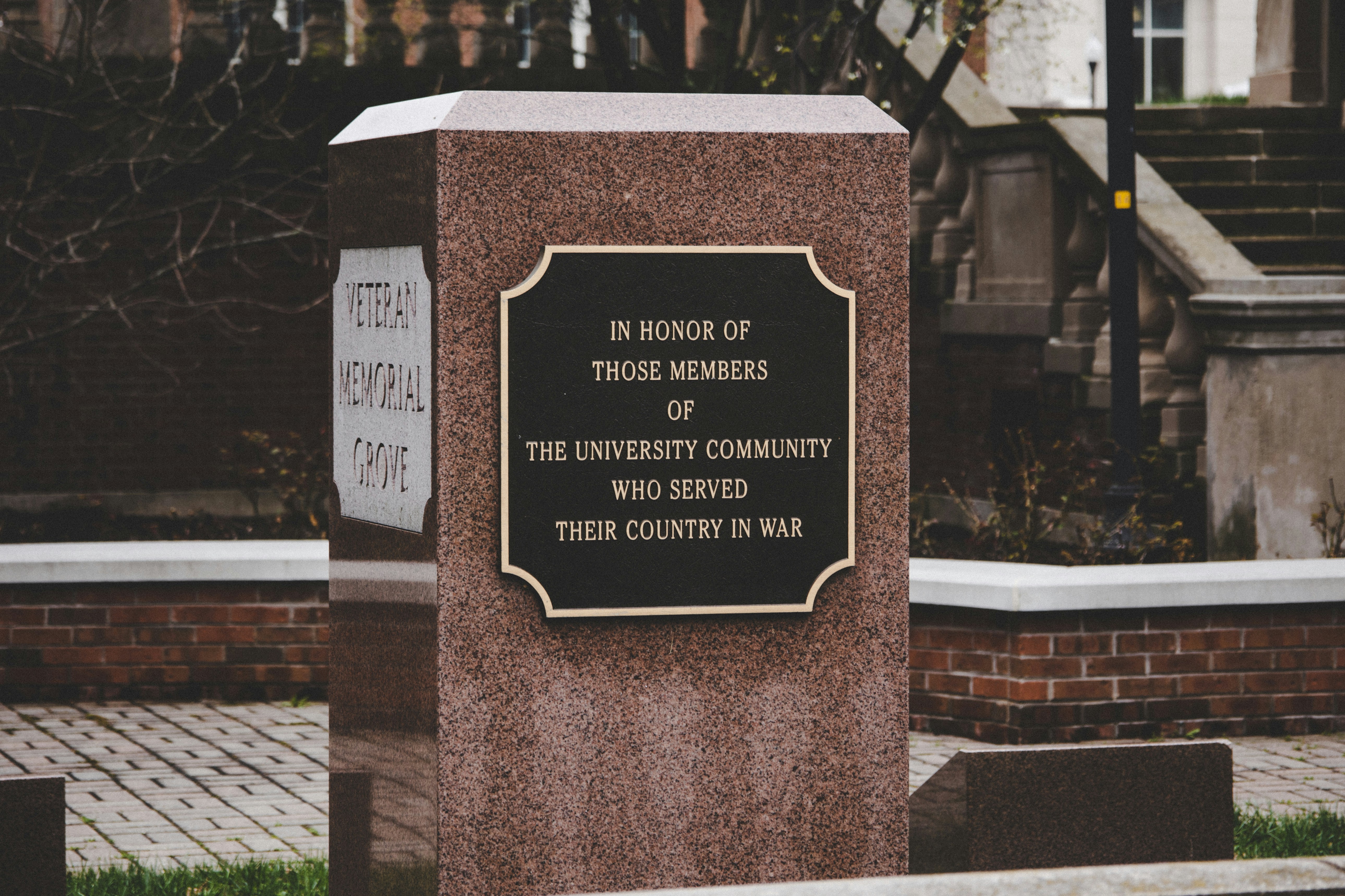 Stone Sentinel at a University Courtyard: Honoring the Fallen