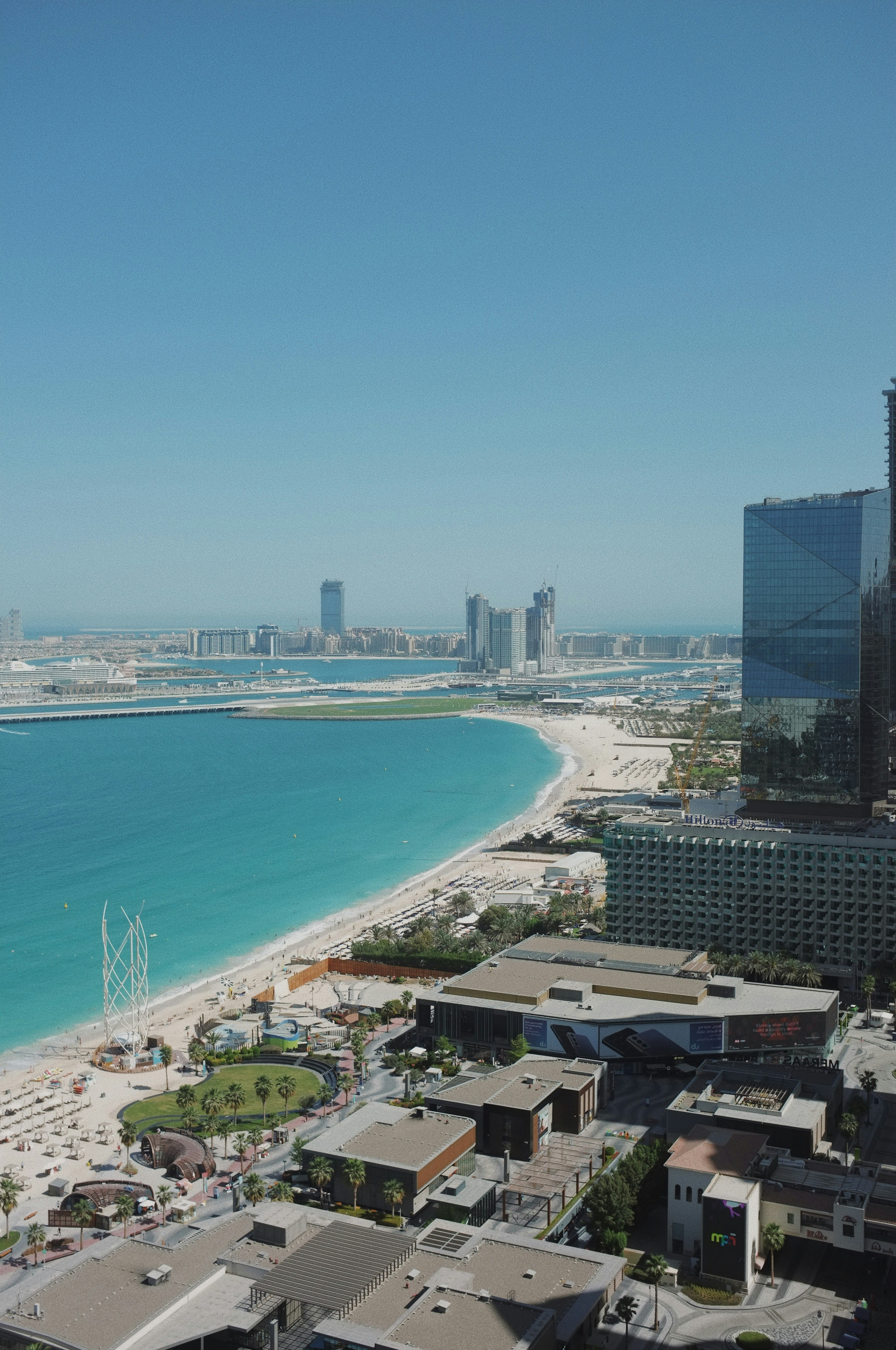 High rise building near sea during daytime photo – Free Landscape Image ...