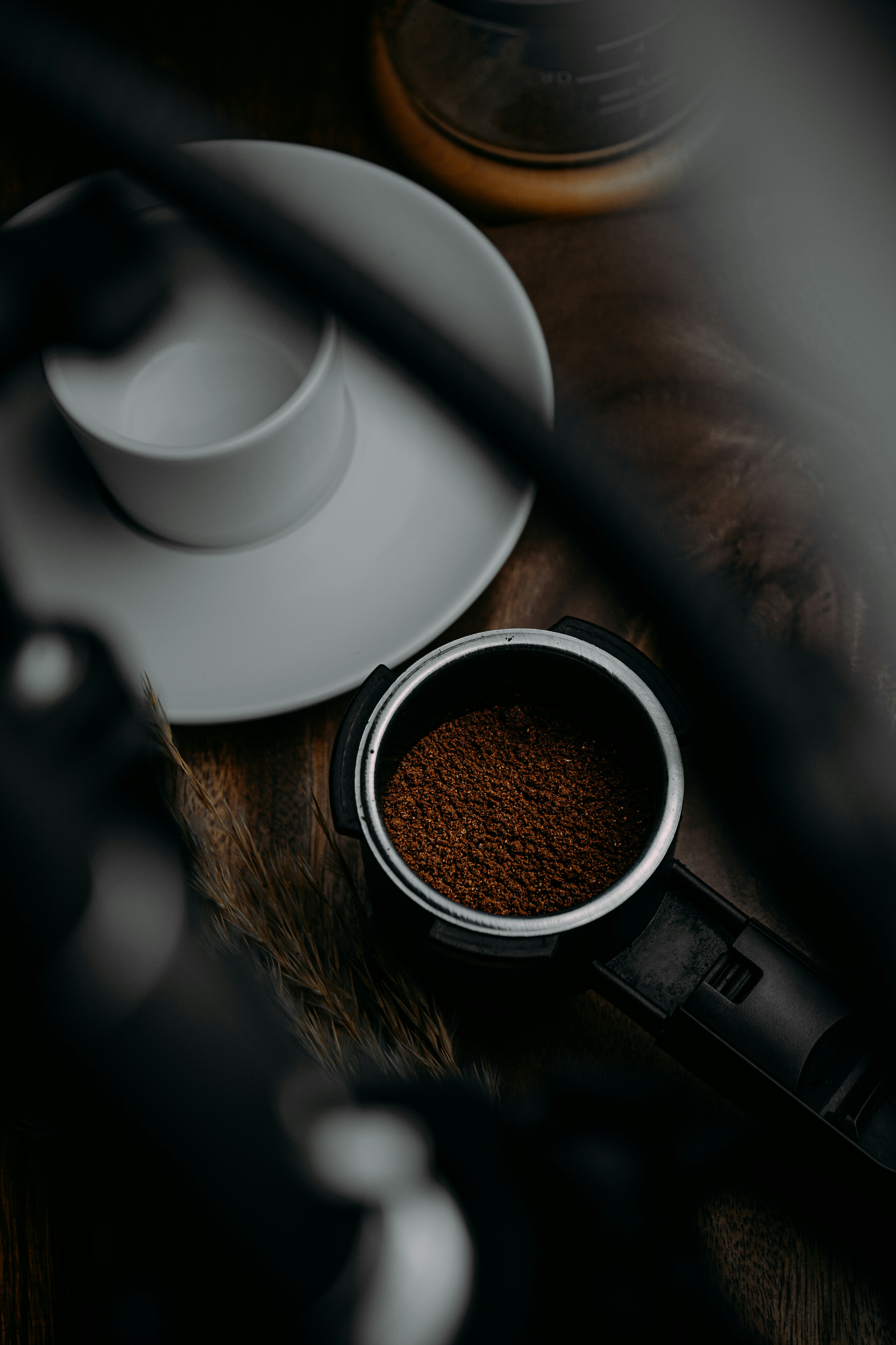 Grounded Focus: Espresso Grounds in a Dim Studio