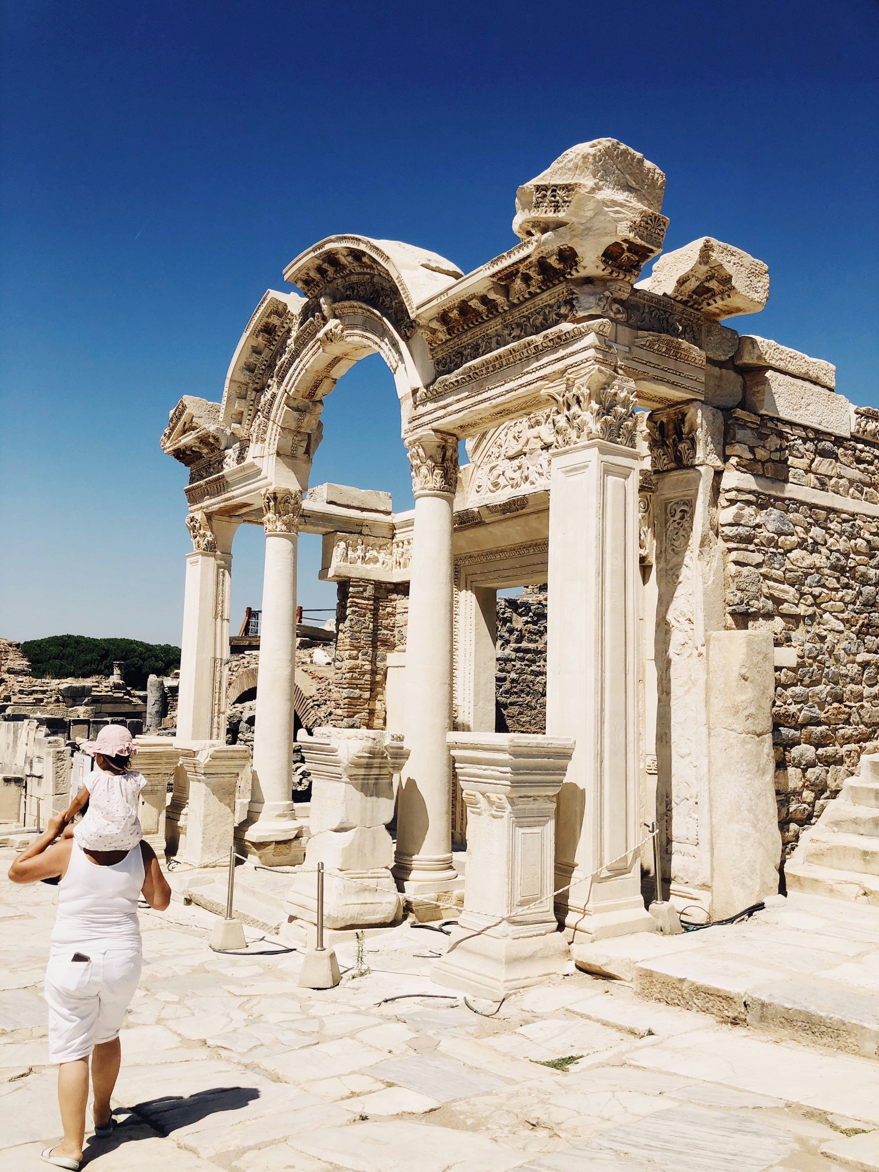 Cerulean Sky Over Time-Worn Archways: A Quiet Stroll Through Ancient Ruins