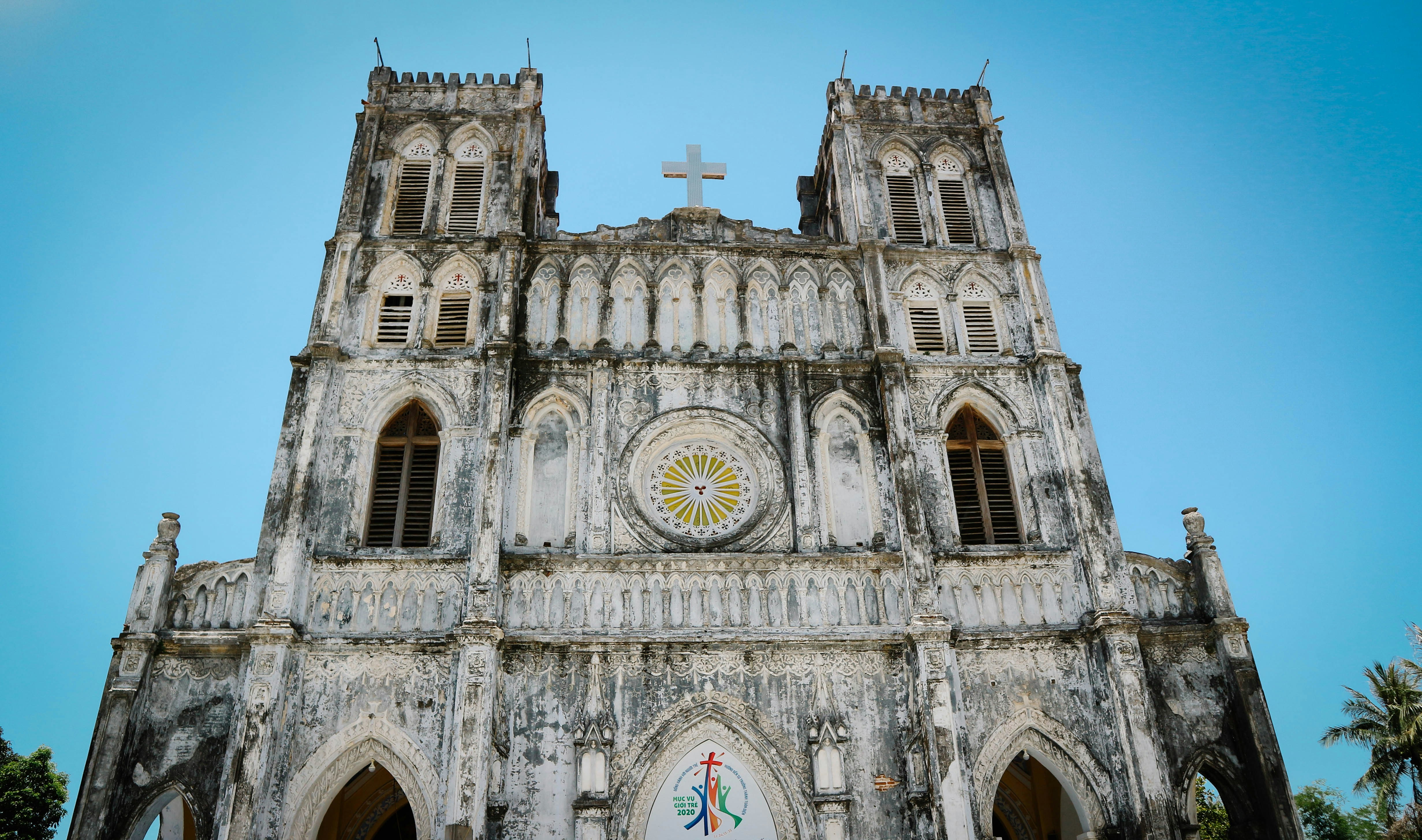 Gray concrete church under blue sky during daytime photo – Free Grey ...