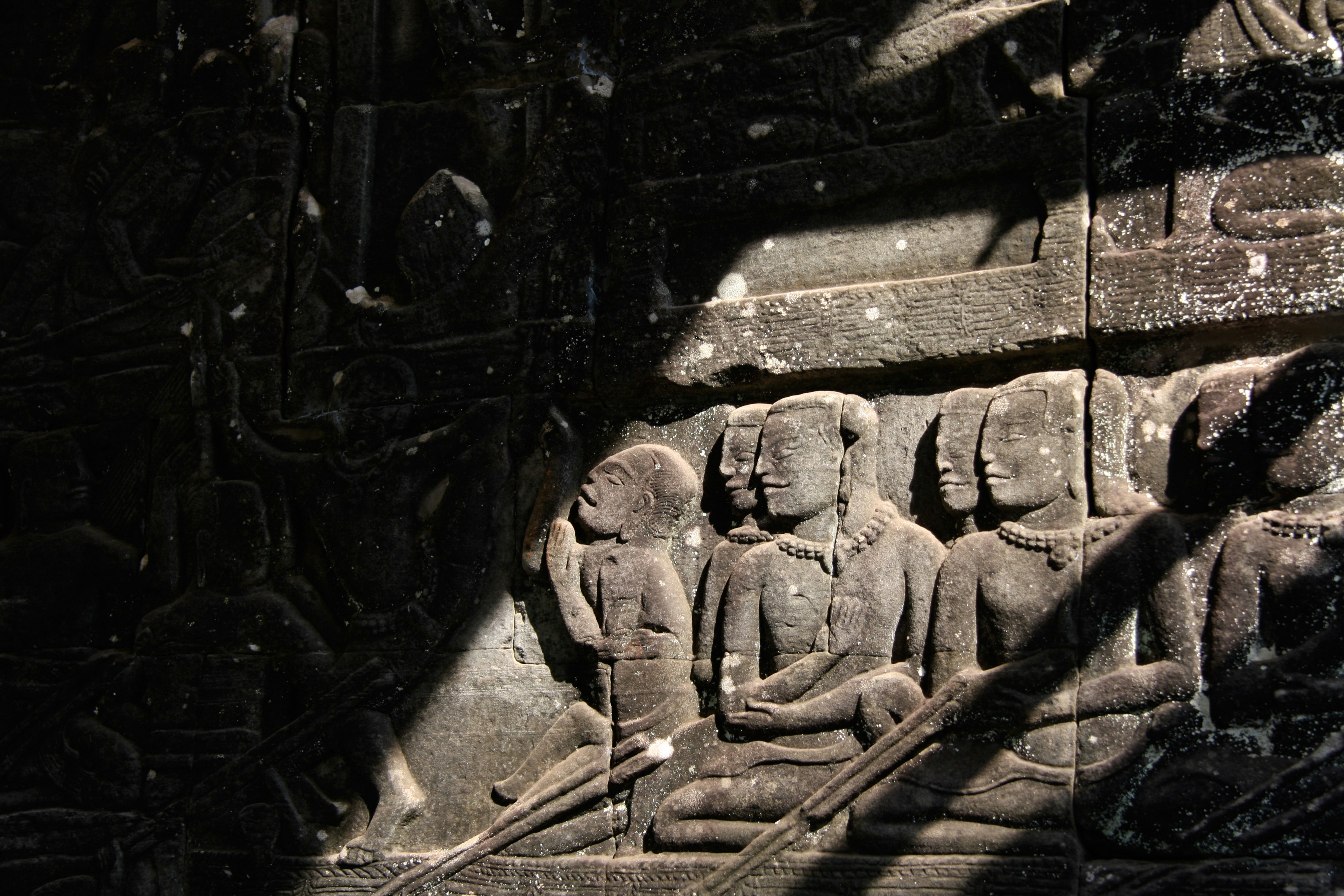 grayscale photo of man in suit jacket