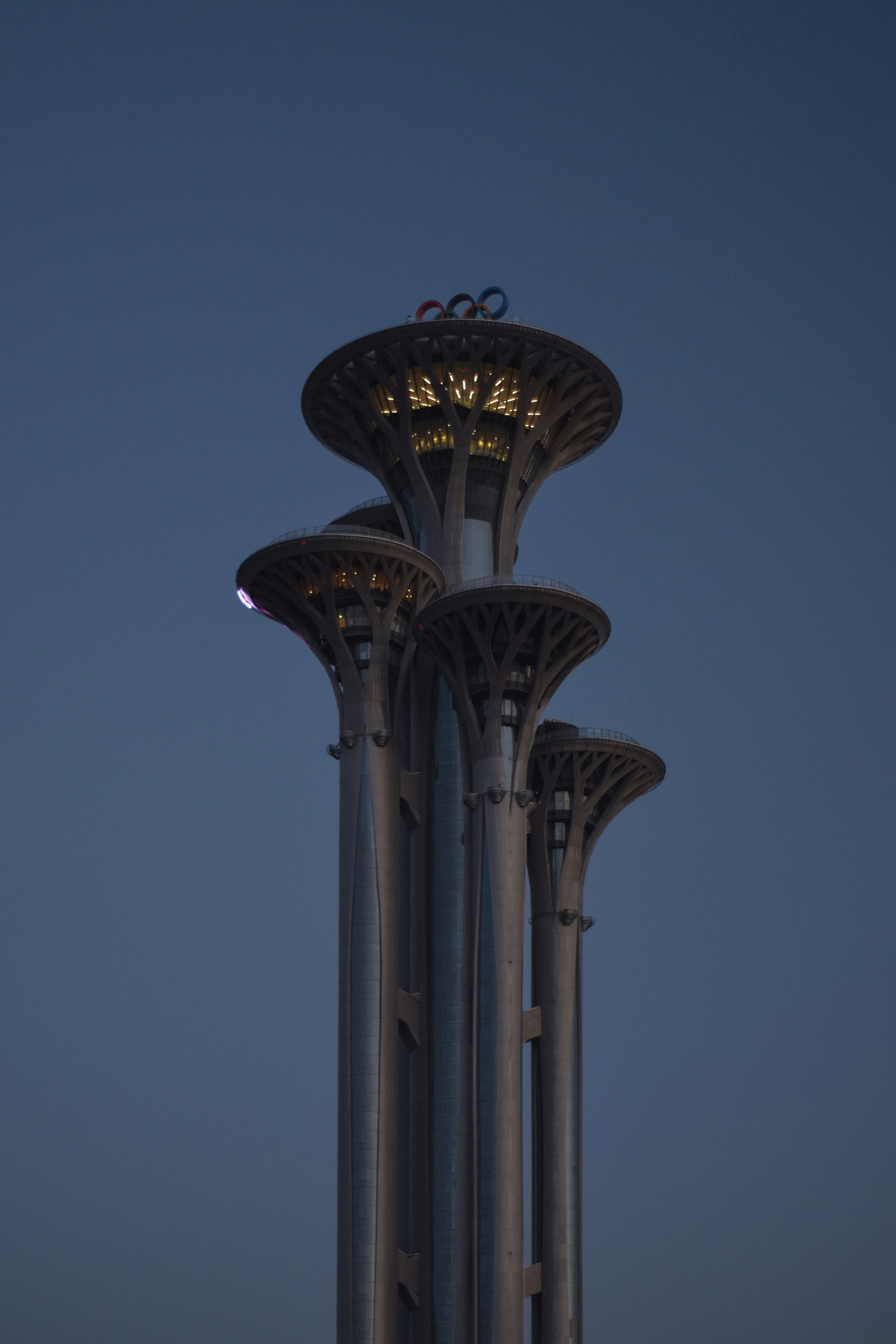 Twilight Crown: Quadruple Towers Reach for a Ringed Sky