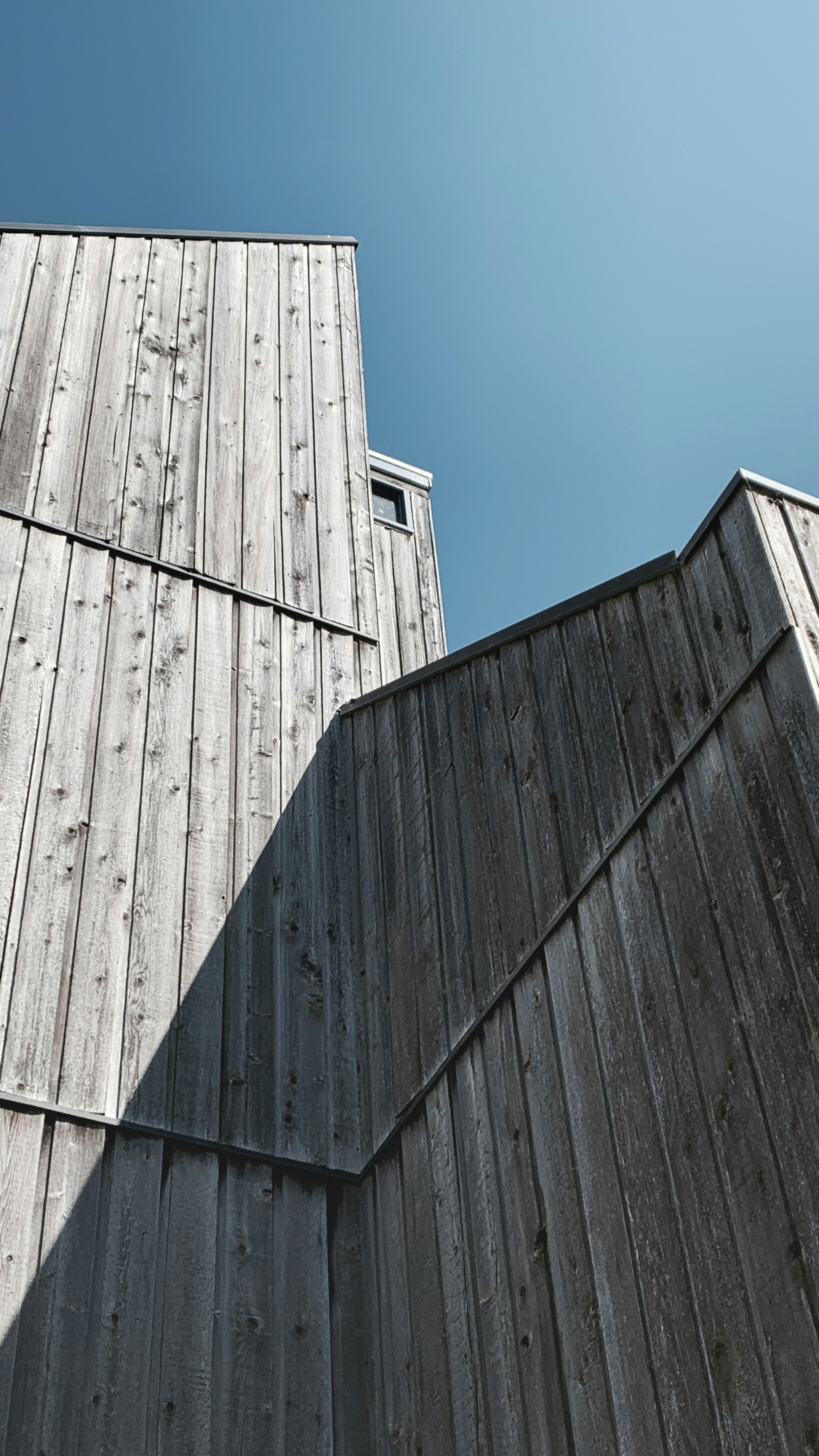 Hidden Window, Bold Angles: A Cubist Study of Weathered Wood