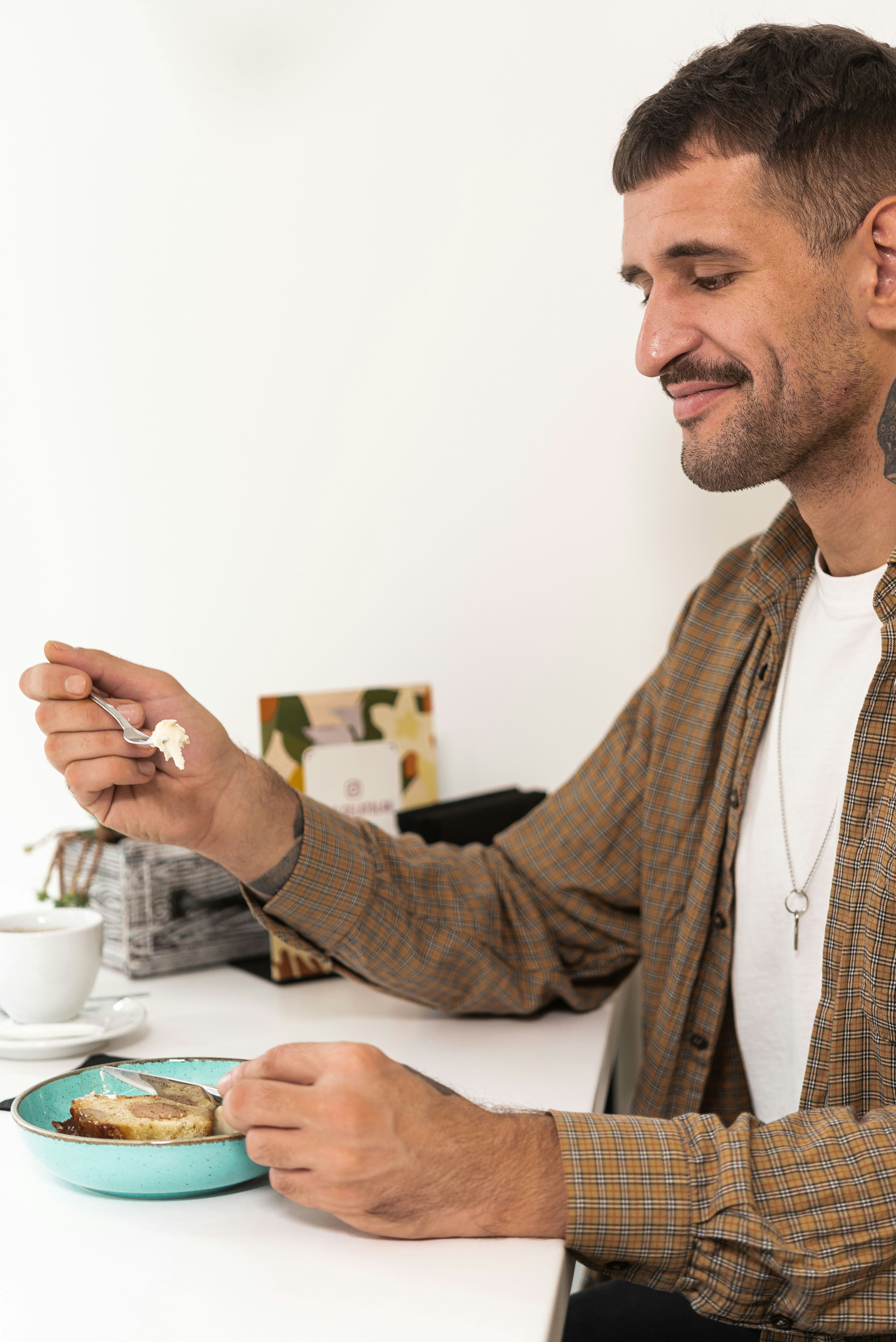 Sunlit Savor: a candid moment of quiet nourishment at a bright kitchen counter