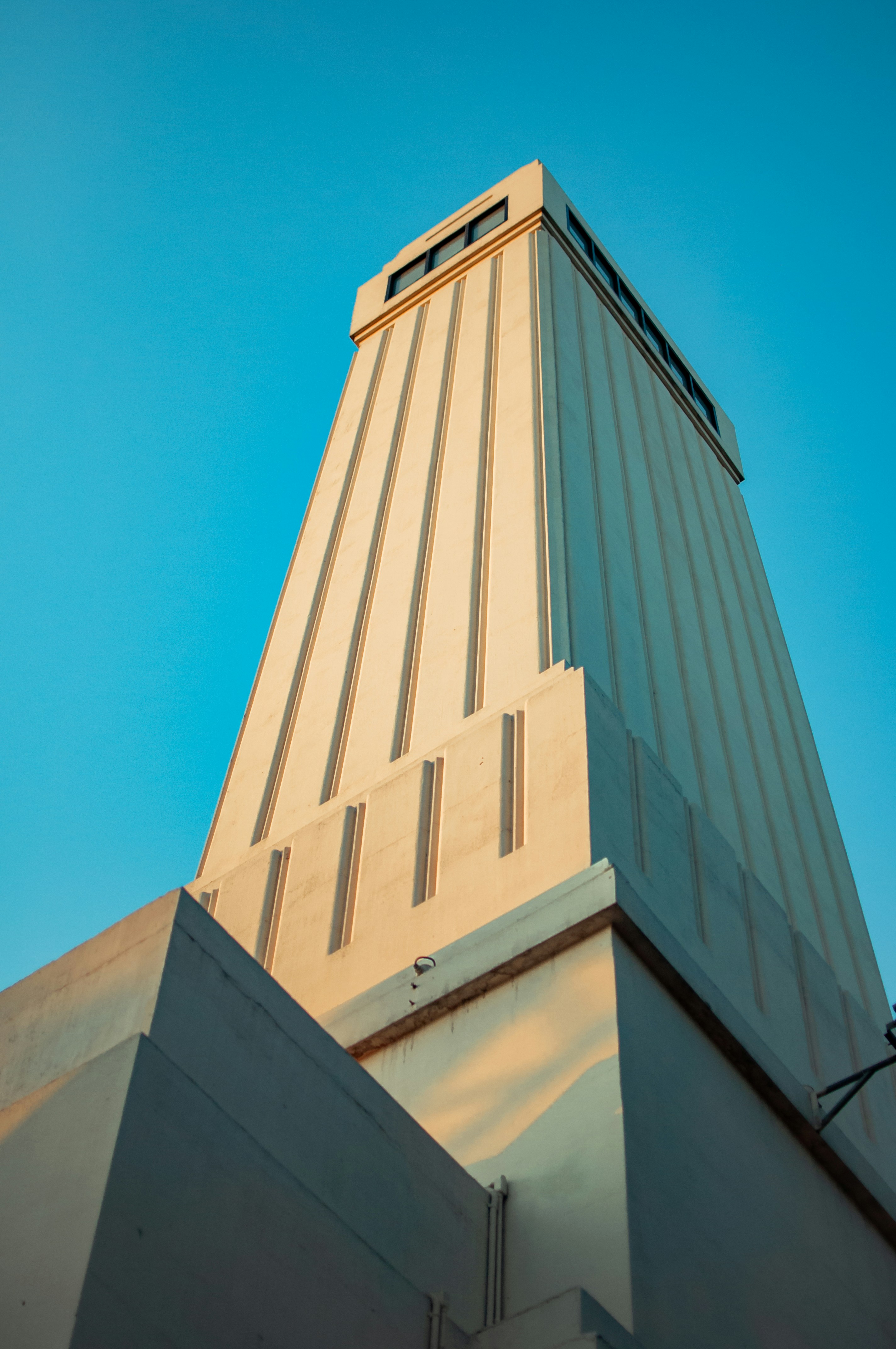 Azure Spire: A Ribbed Tower Reaching Toward the Sky