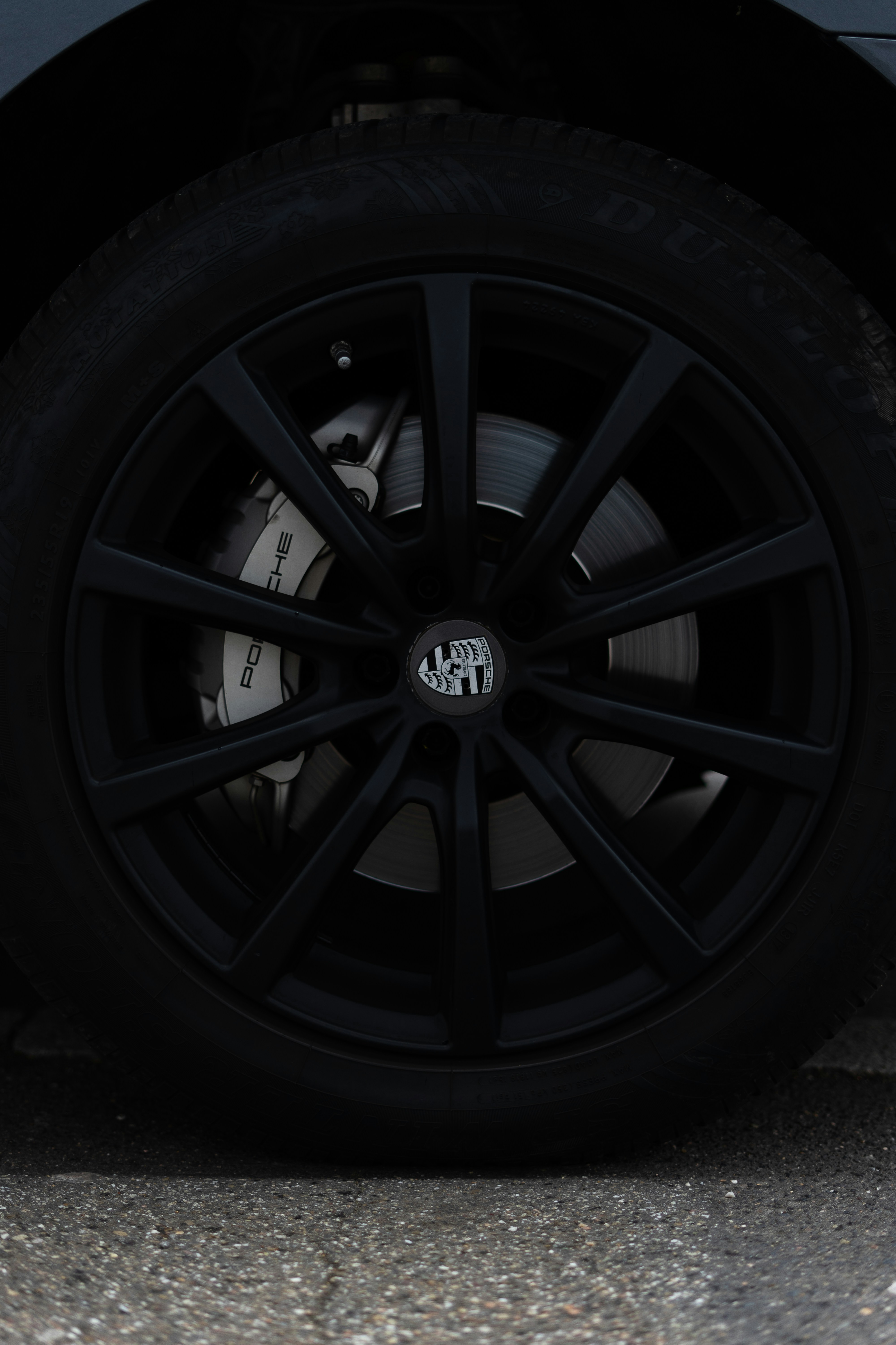 black 5 spoke wheel with tire
