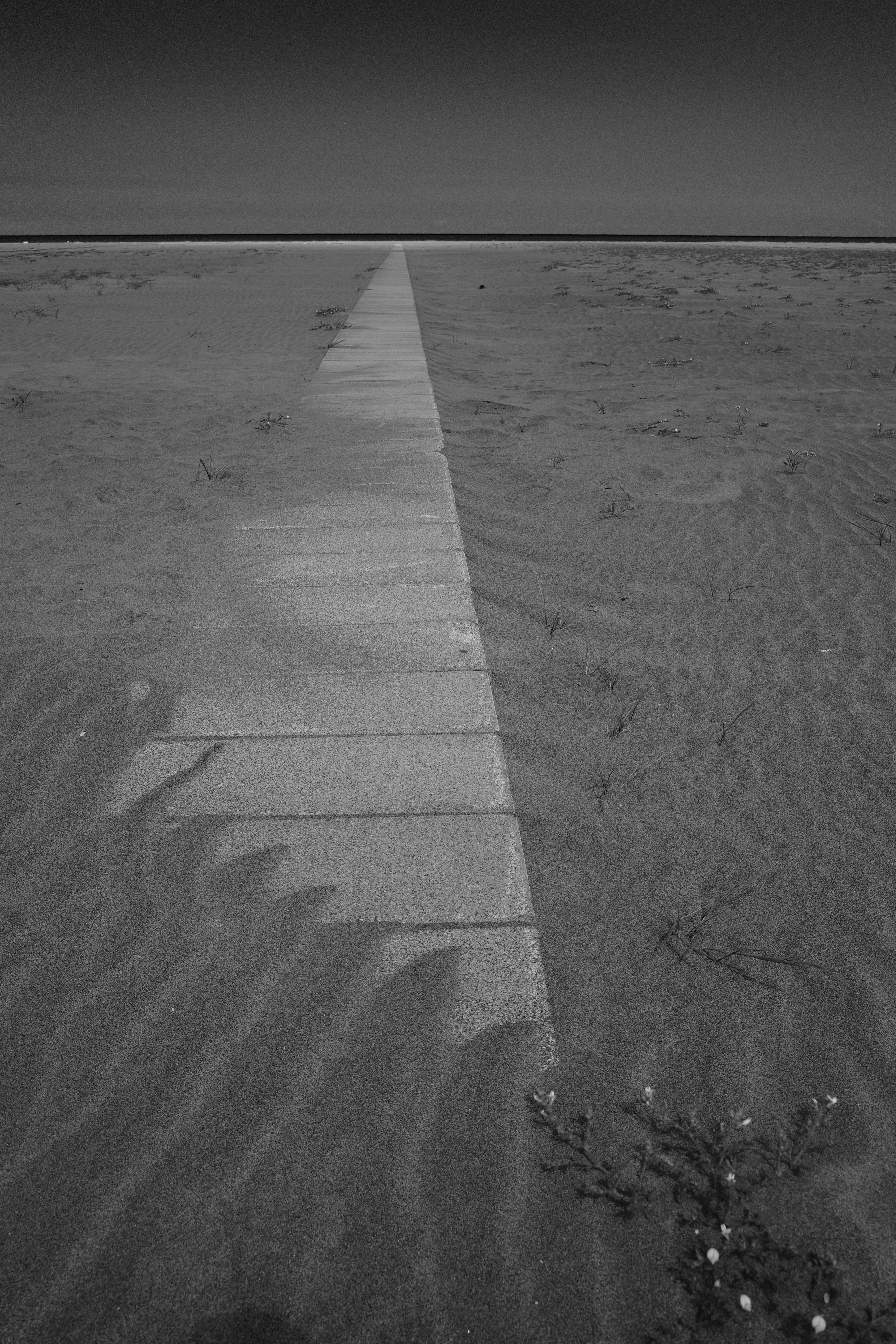Grayscale photo of concrete pavement photo – Free Grey Image on Unsplash