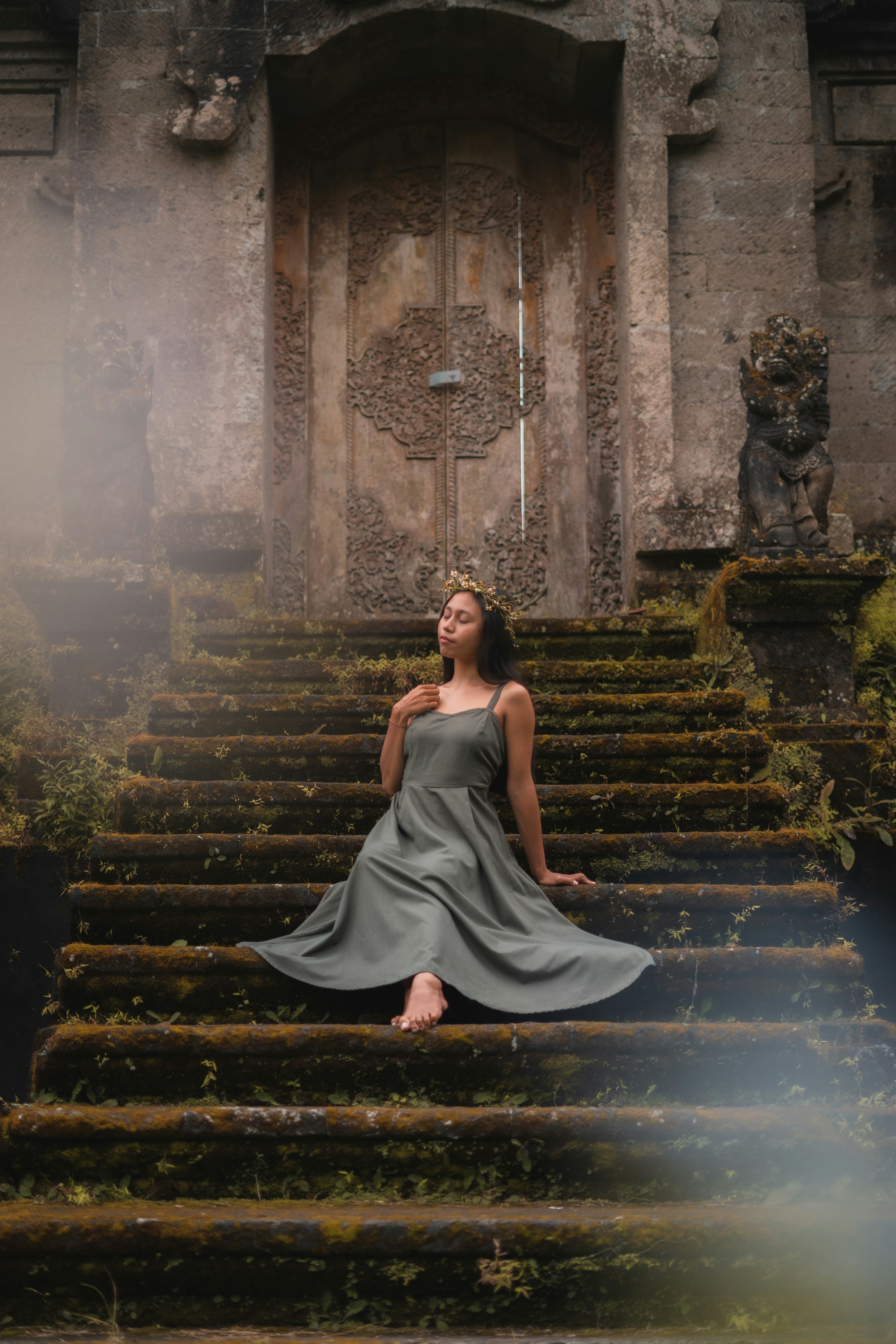 Moss-Cloaked Steps and a Quiet Muse at the Temple Door