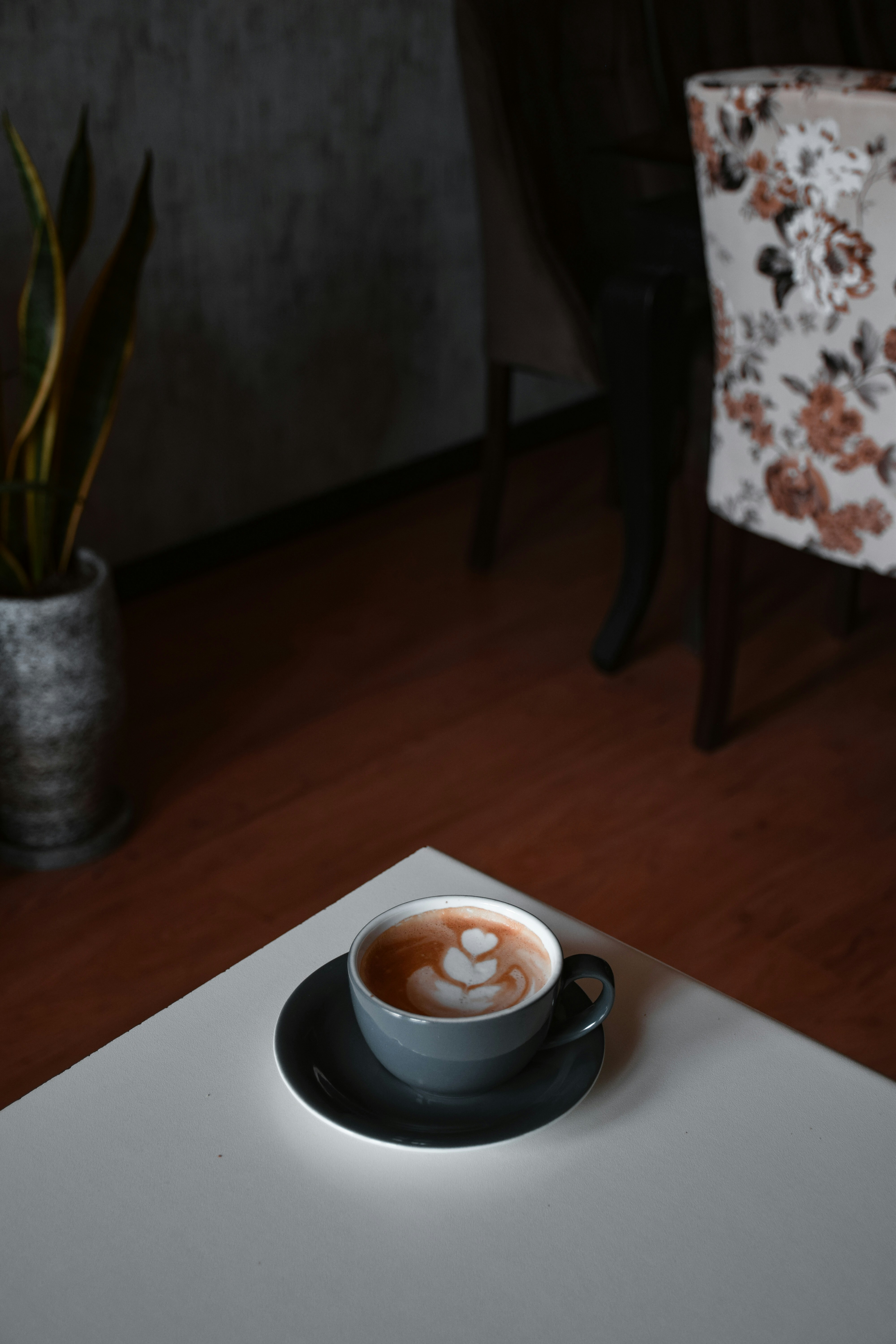 Heart on Foam in a Dim Corner: A Quiet Table Still Life
