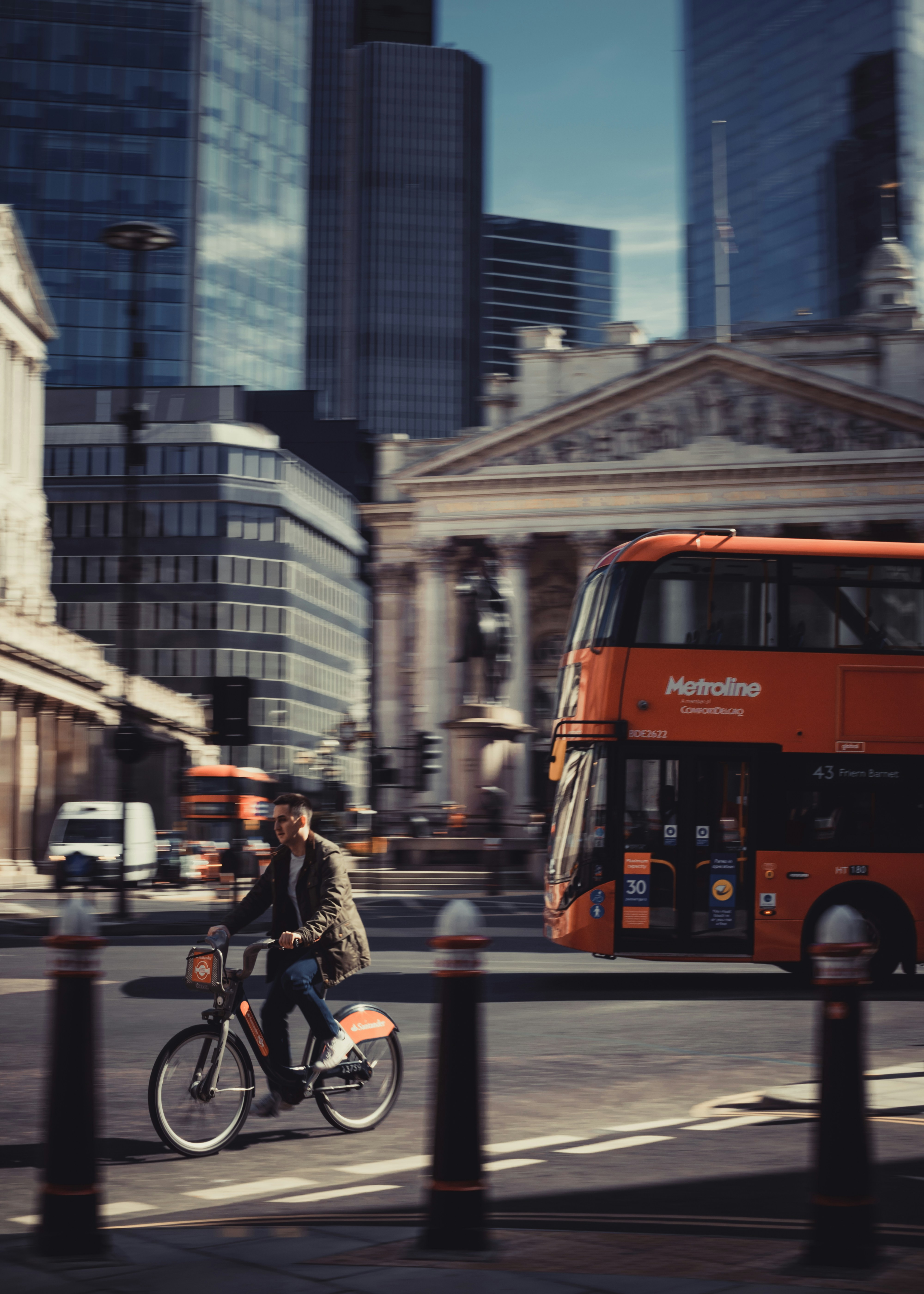 Cyclist in Orange City: A Street Portrait