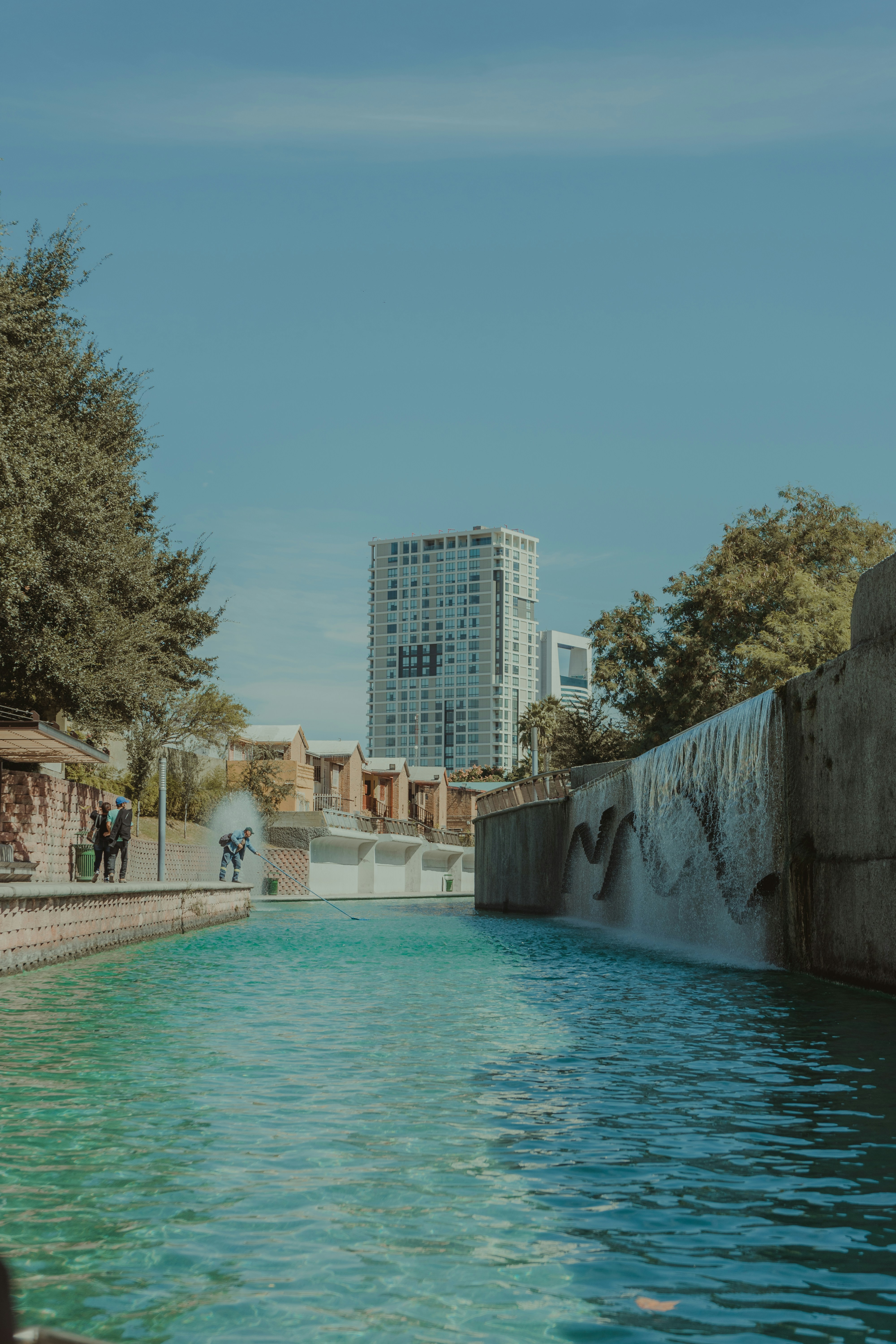 Confluence of Water and Glass: Riverside Tower Rising