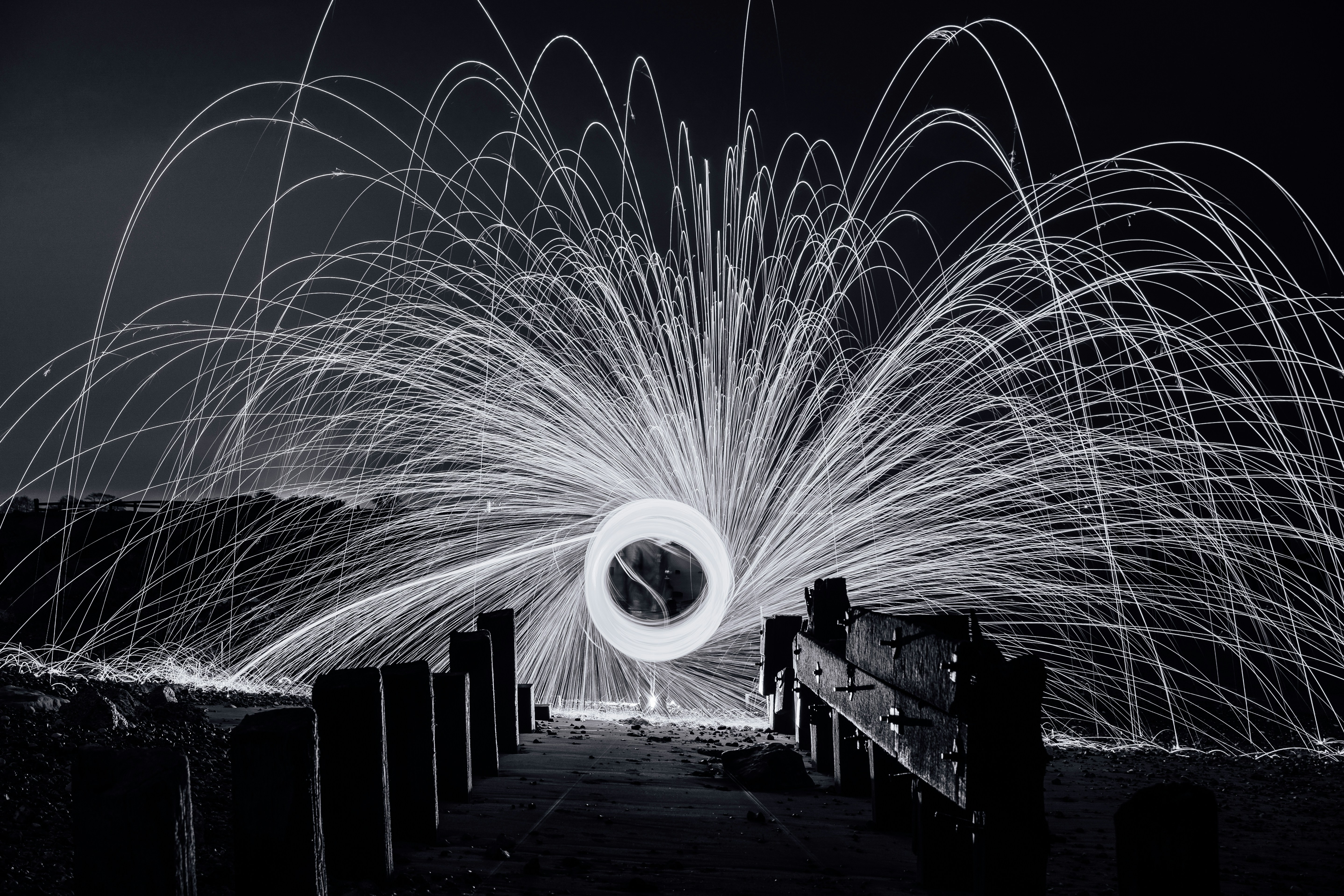 Whirls of Light: A Dance on the Shoreline