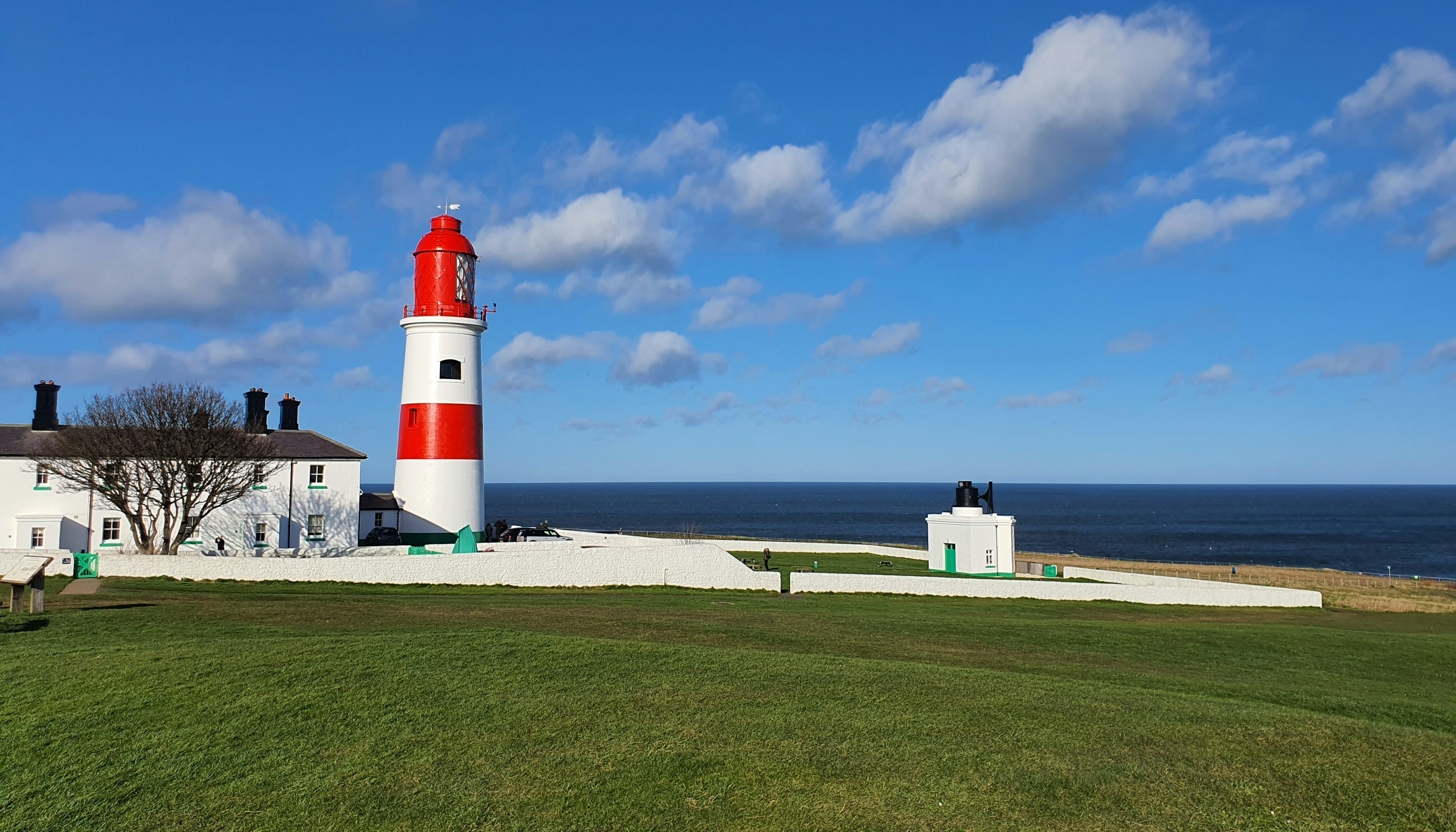 Coastal Beacon Under Azure Skies
