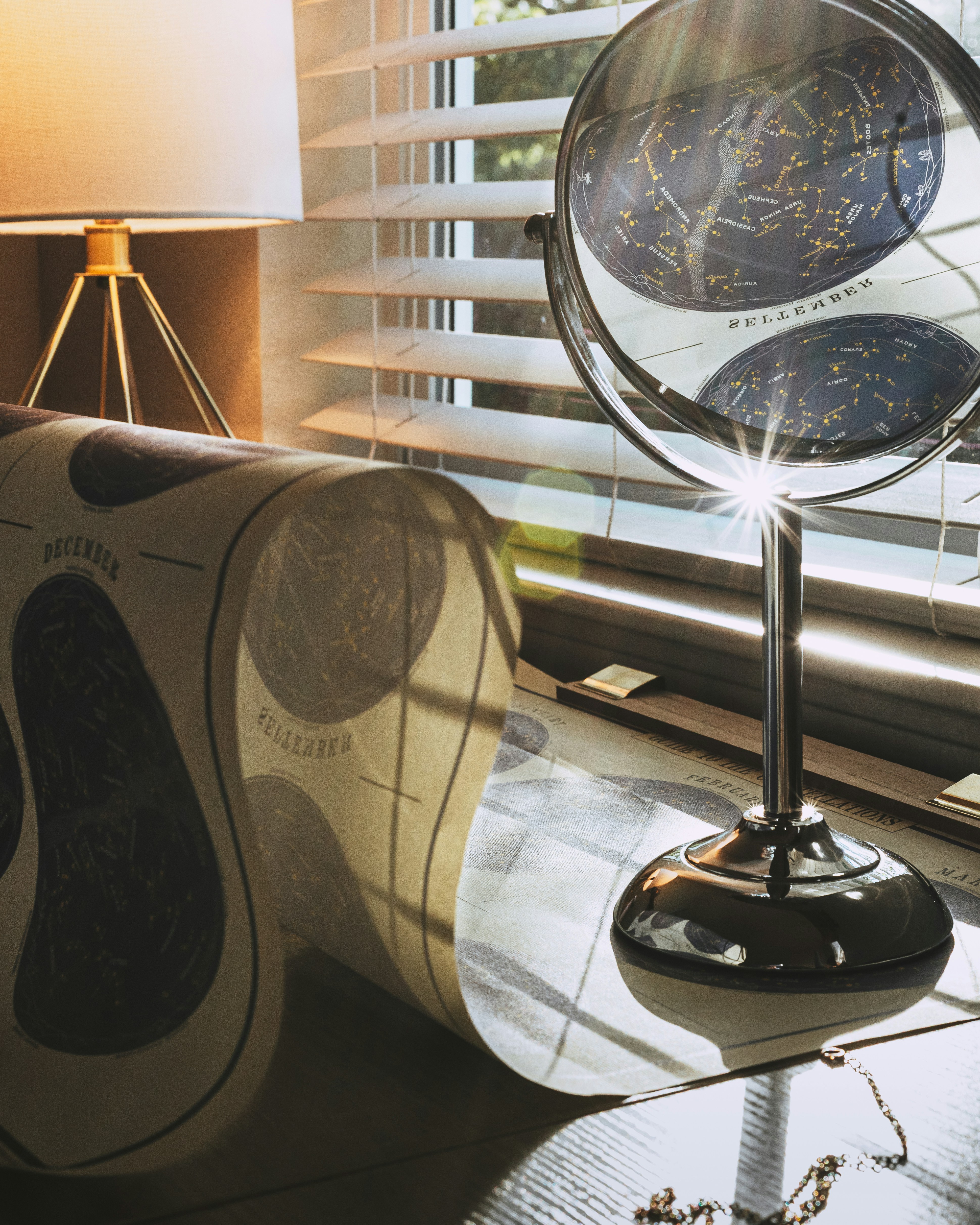 Constellations on Glass: Sunlit Desk with a Star-Map Mirror