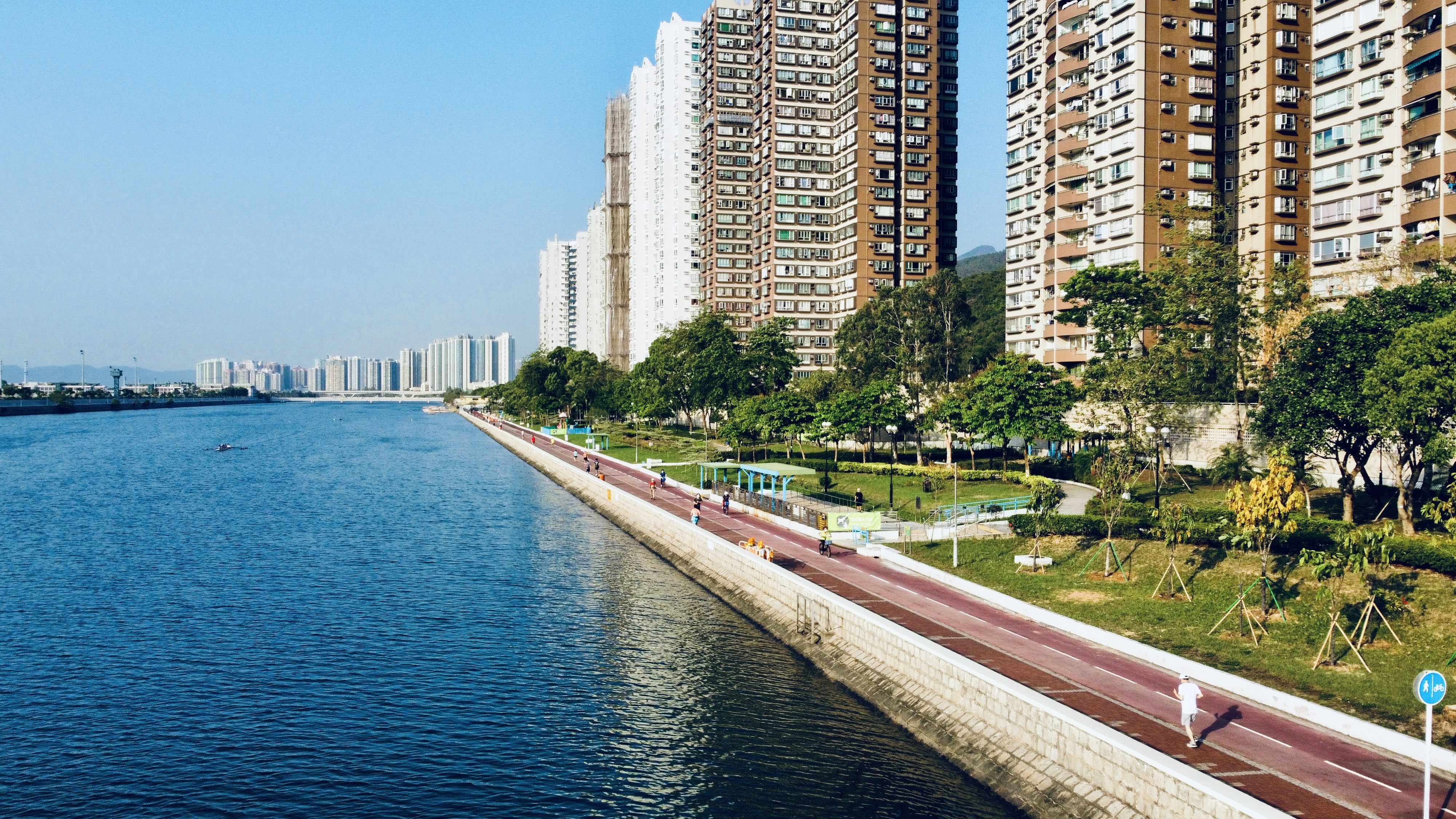Body of water near high rise buildings during daytime photo – Free ...