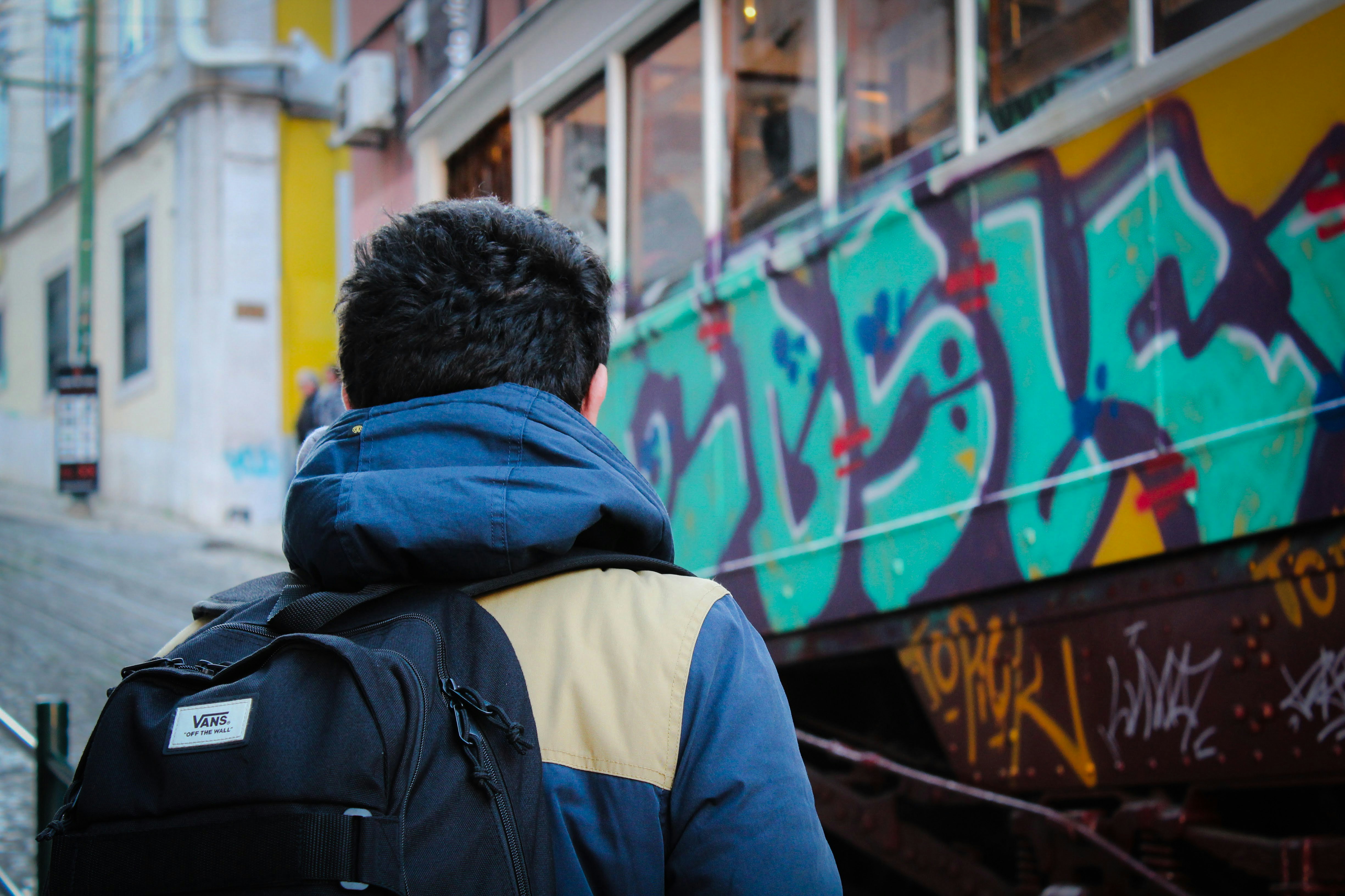 Backpack and Graffiti Corridor: A City Walk into Color