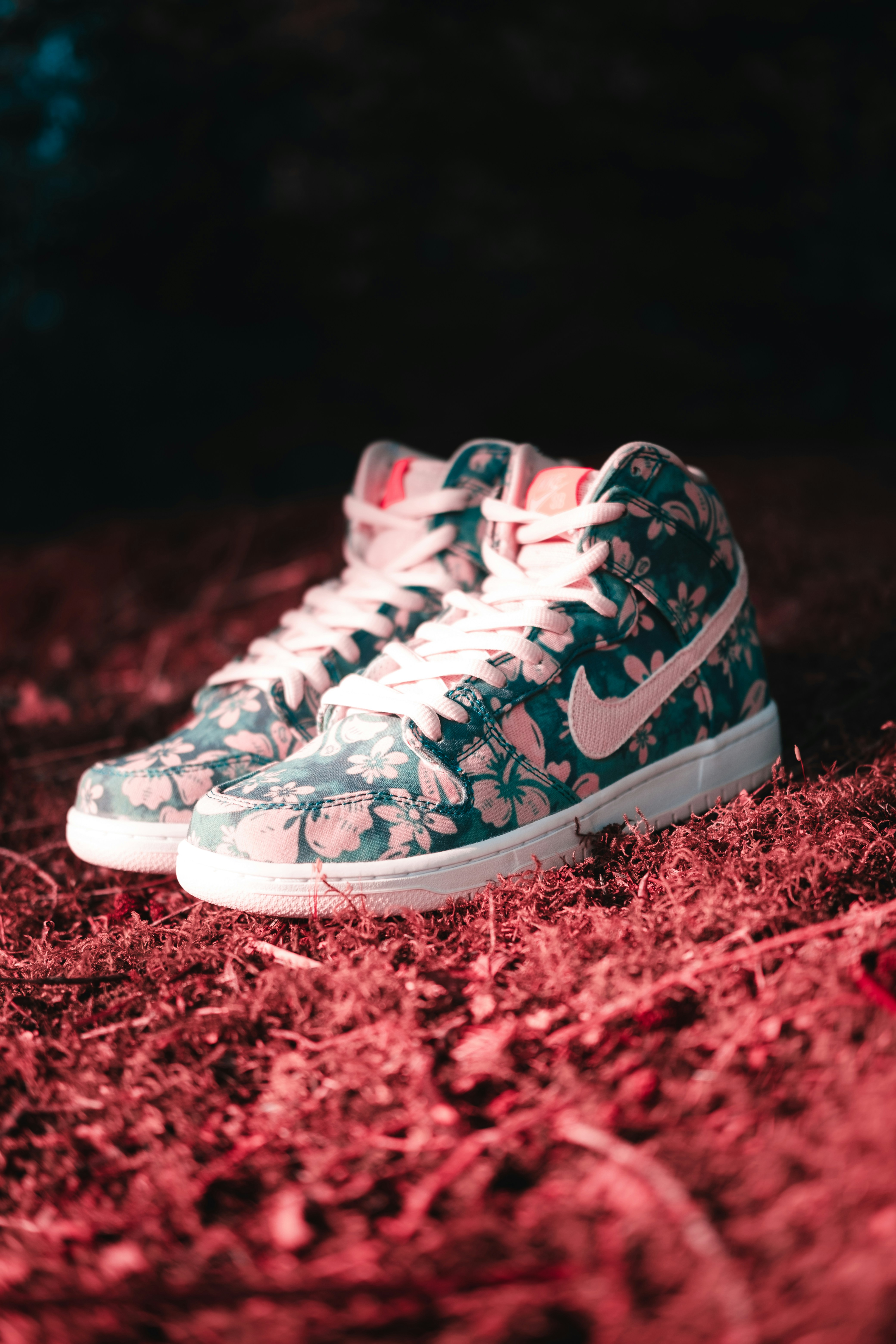 Floral Nike High-Tops Resting on a Crimson Field