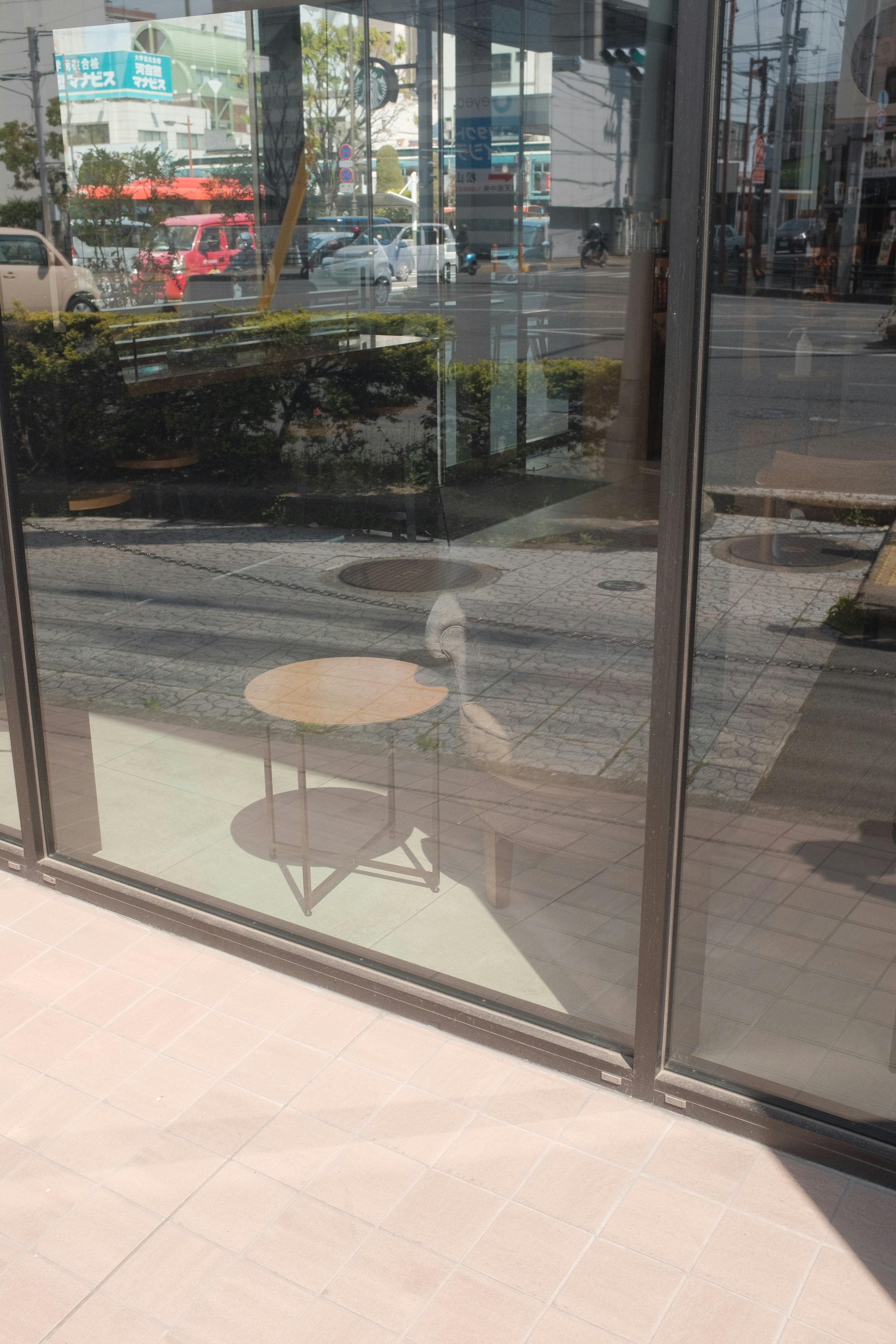 white round table near glass window