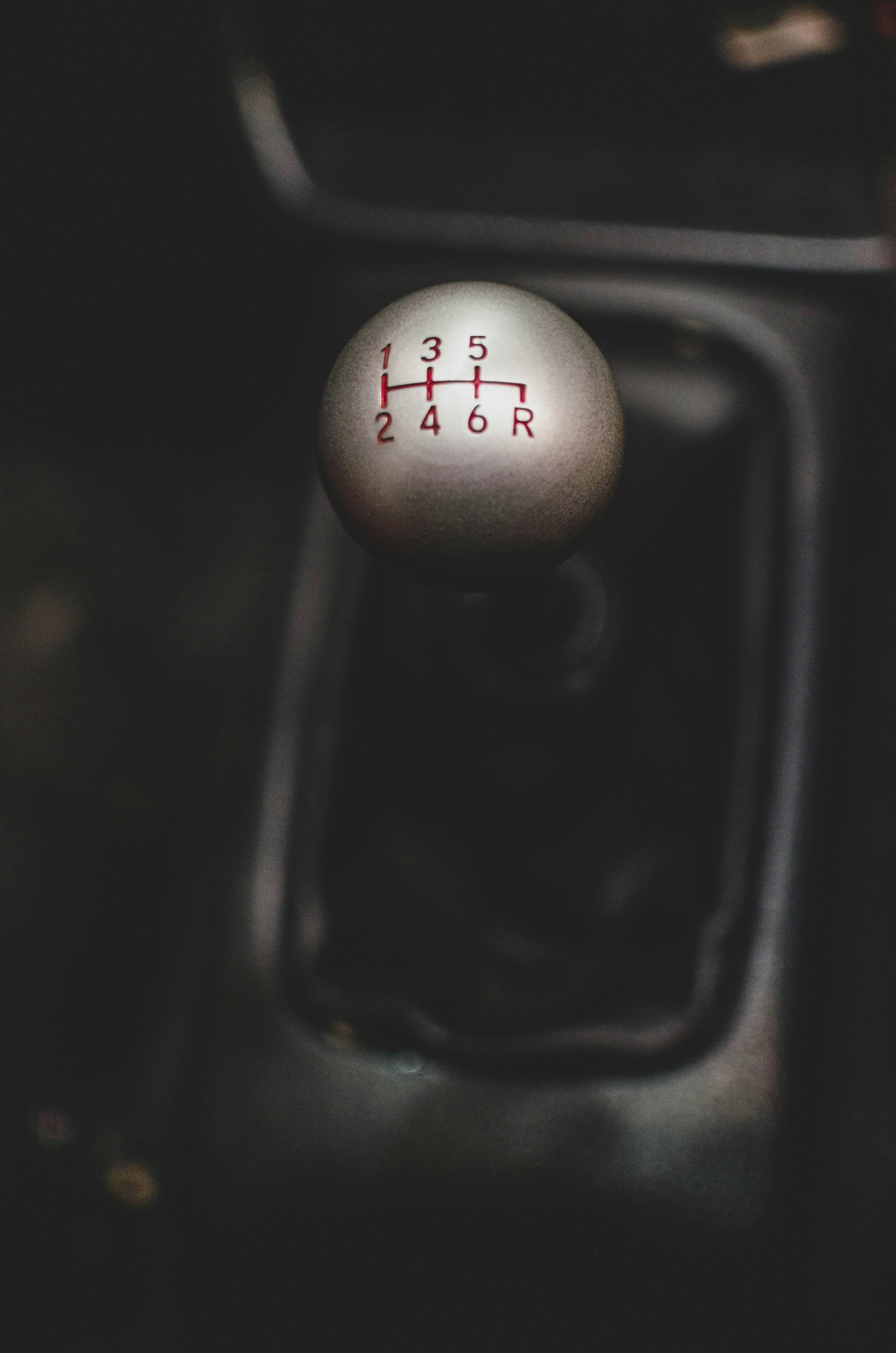 Macro Portrait of a Manual Gear Knob: Red Shift Pattern and Patina