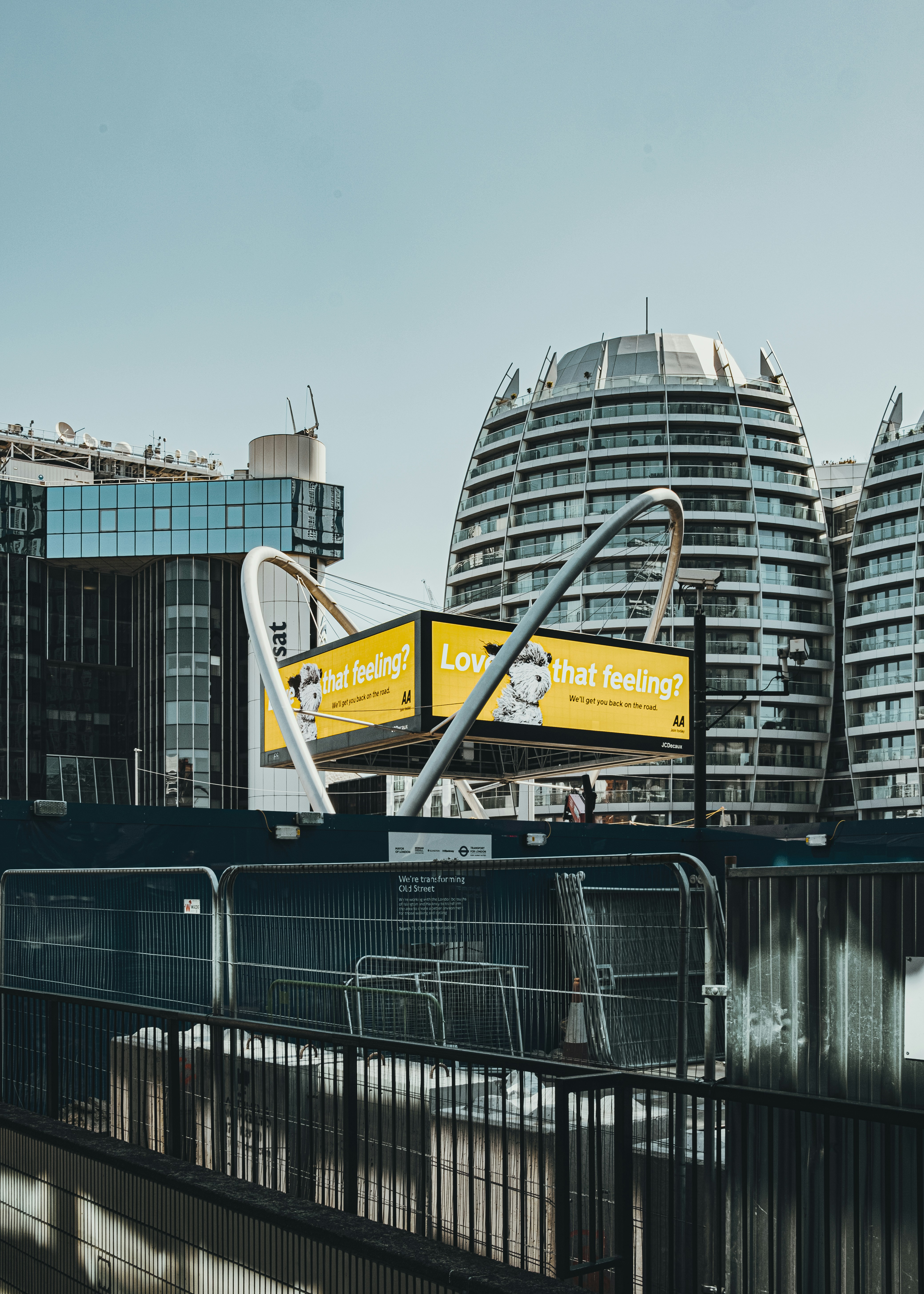 blue and white building near body of water during daytime